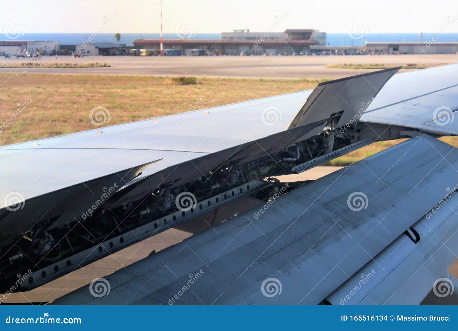 Detail of the Wing of a 737 Aircraft during the Landing Phase with the ...