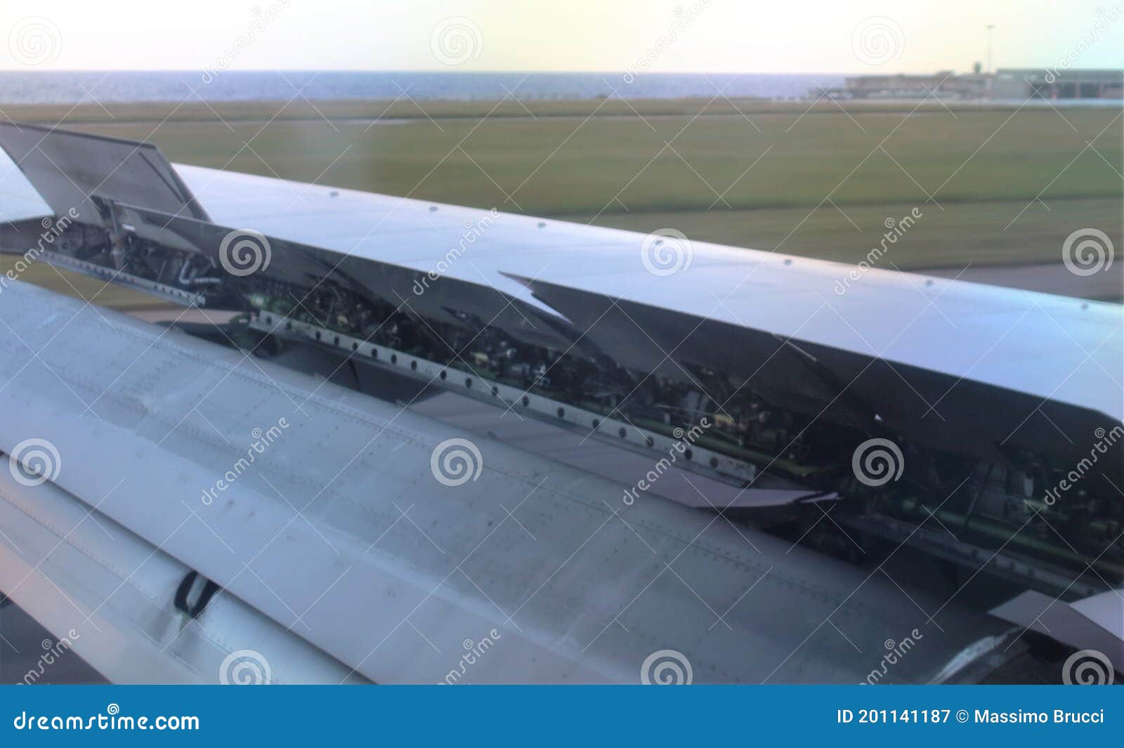 Detail of the Wing of a 737 Aircraft during the Landing Phase with the ...