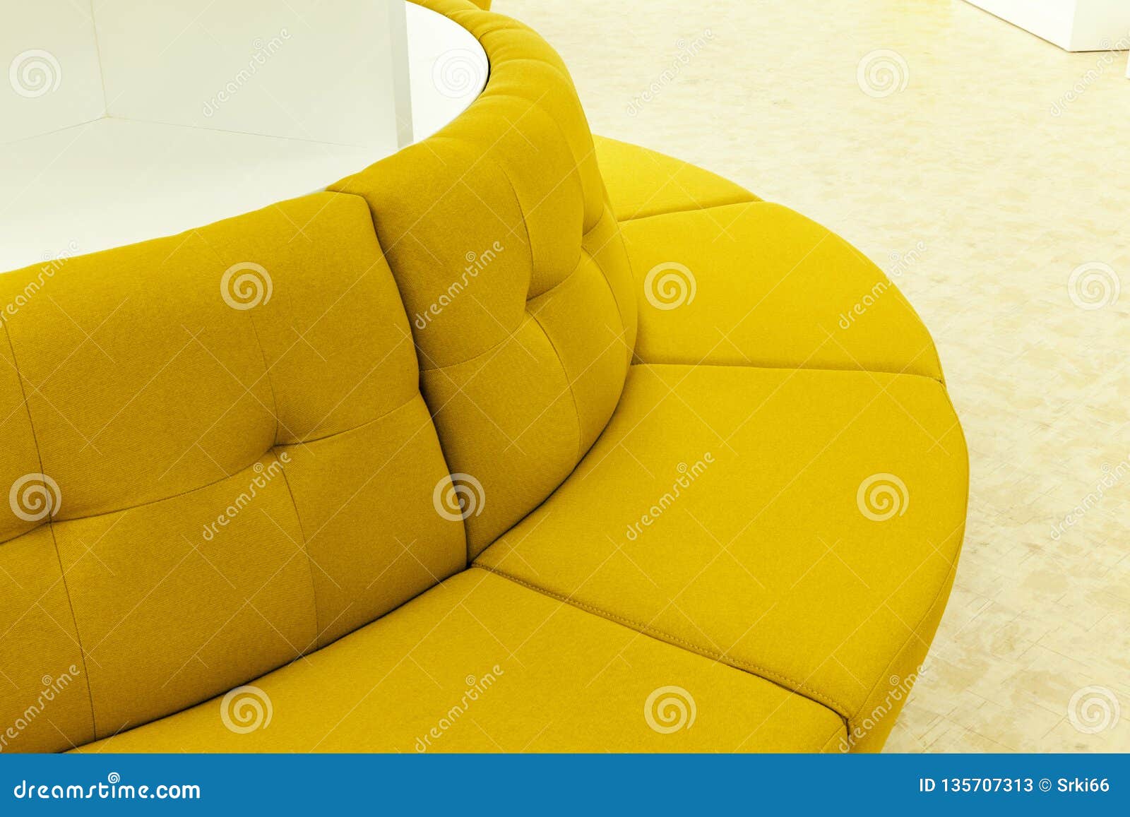 Detail of yellow sofas stock image. Image of light, elegant - 135707313