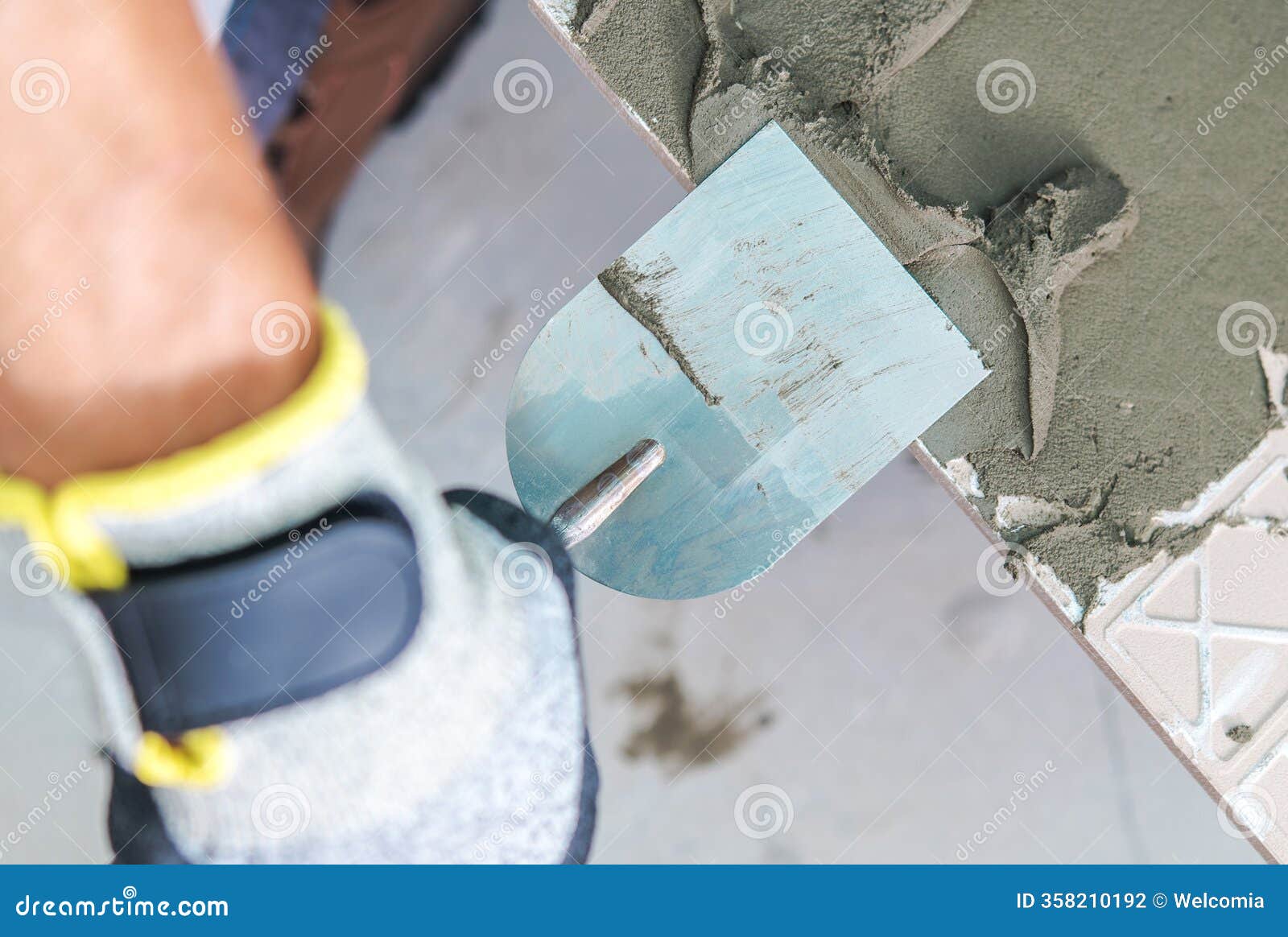 Detailed Tiling Work in a Construction Site Using a Trowel Stock Photo ...