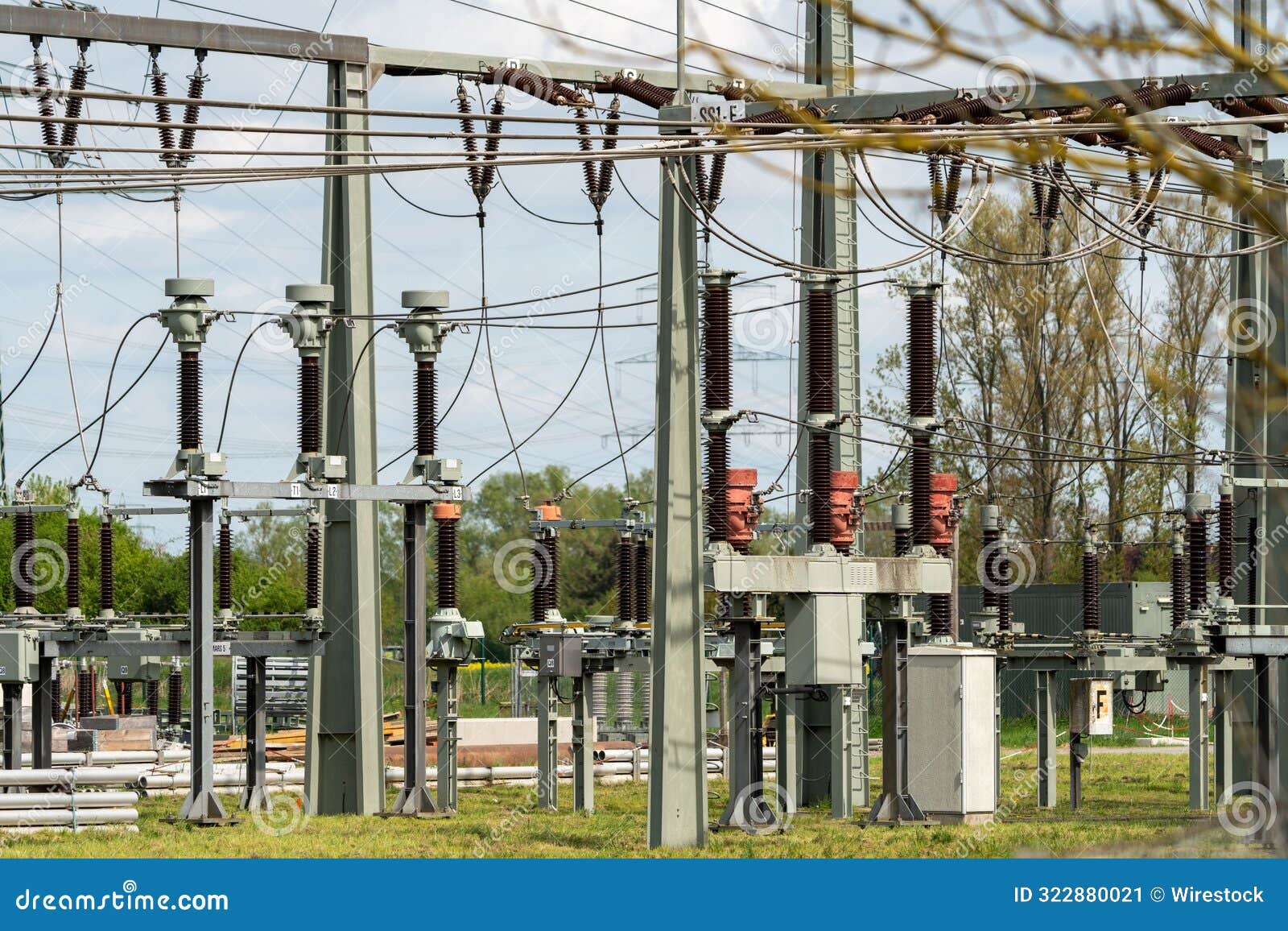 A Detailed View of an Electrical Substation with Various Components and ...