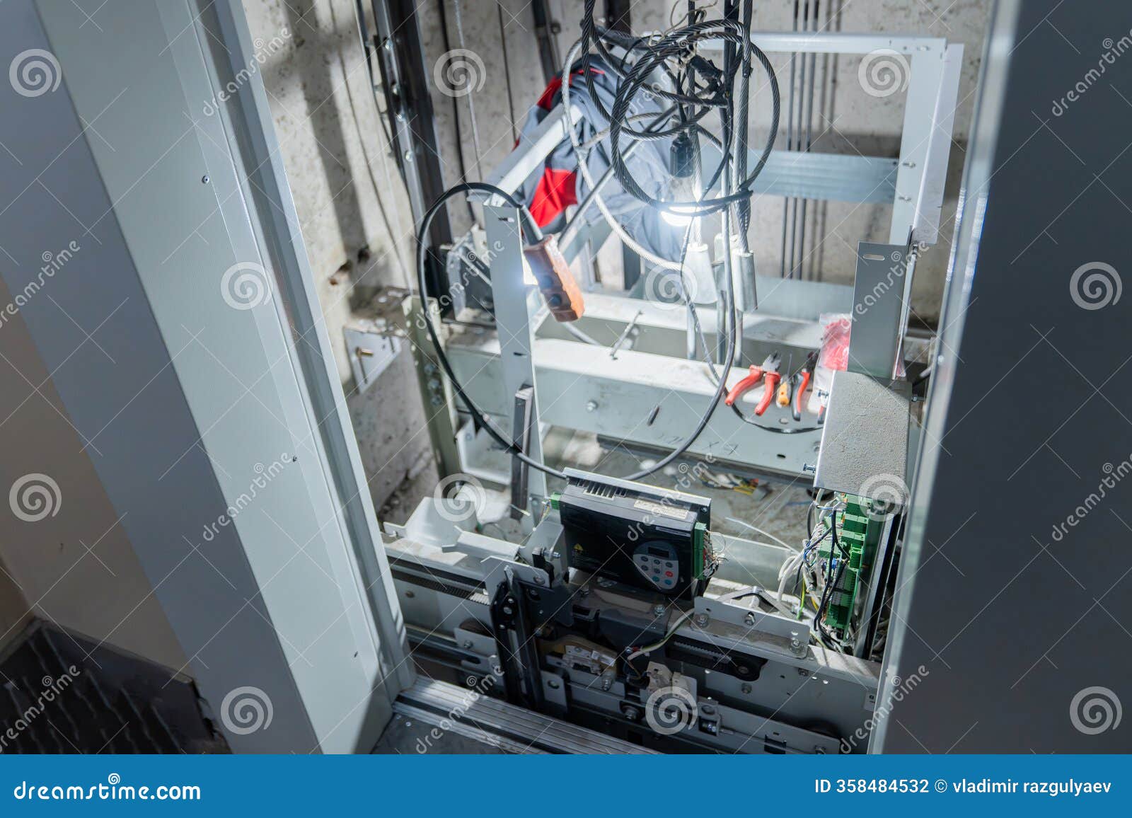 This is an Interior View of an Elevator Shaft with Essential Mechanical ...