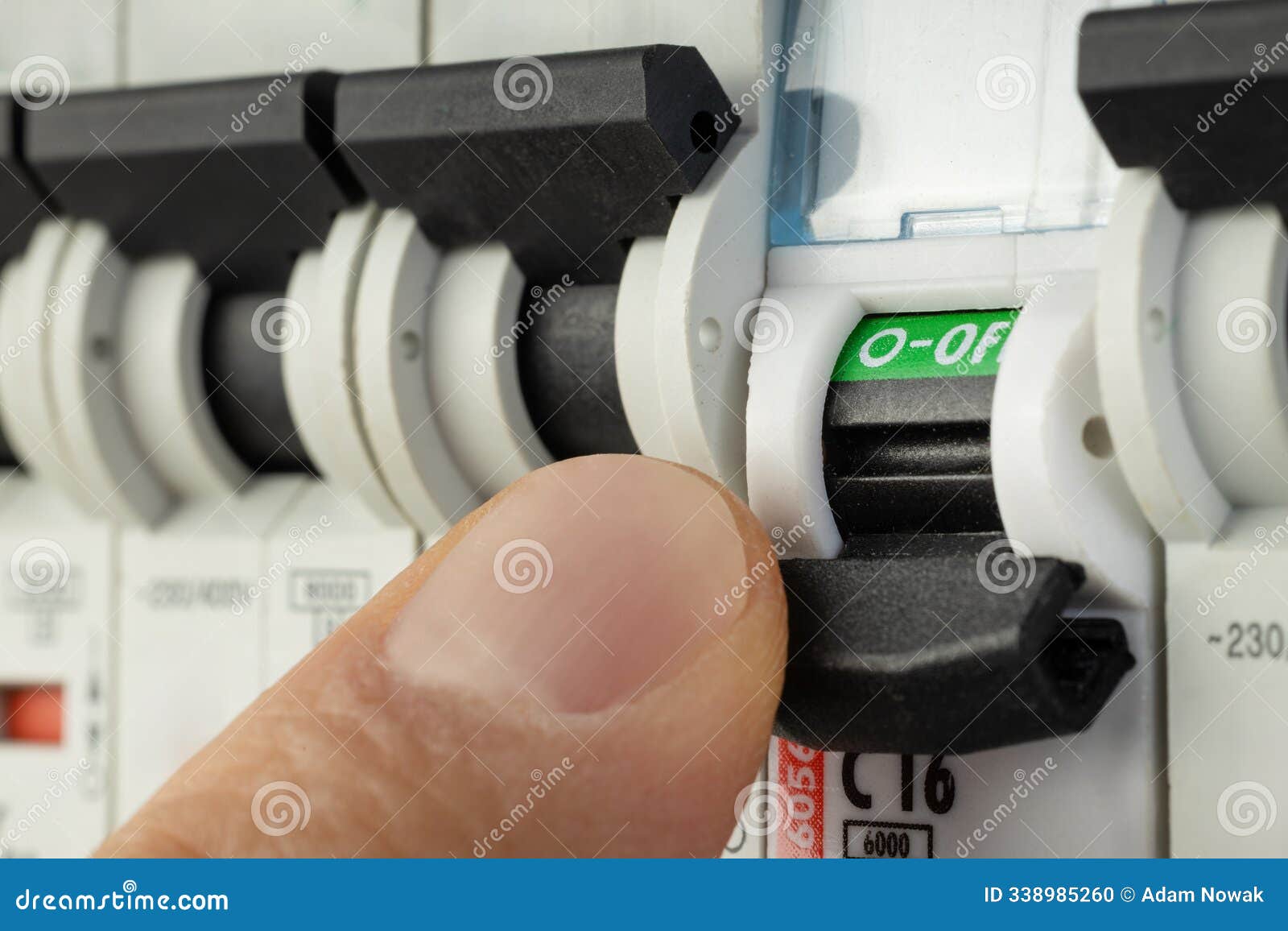 Hand Flipping Electrical Switch in Breaker Panel Stock Photo - Image of ...