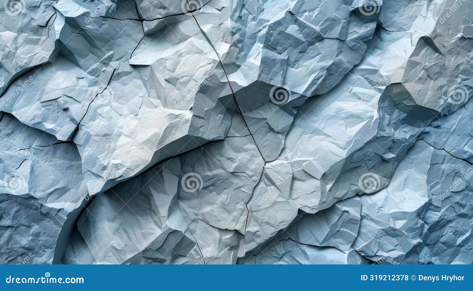 Detailed View of a Rugged Rock Face with Triangular Patterns and ...