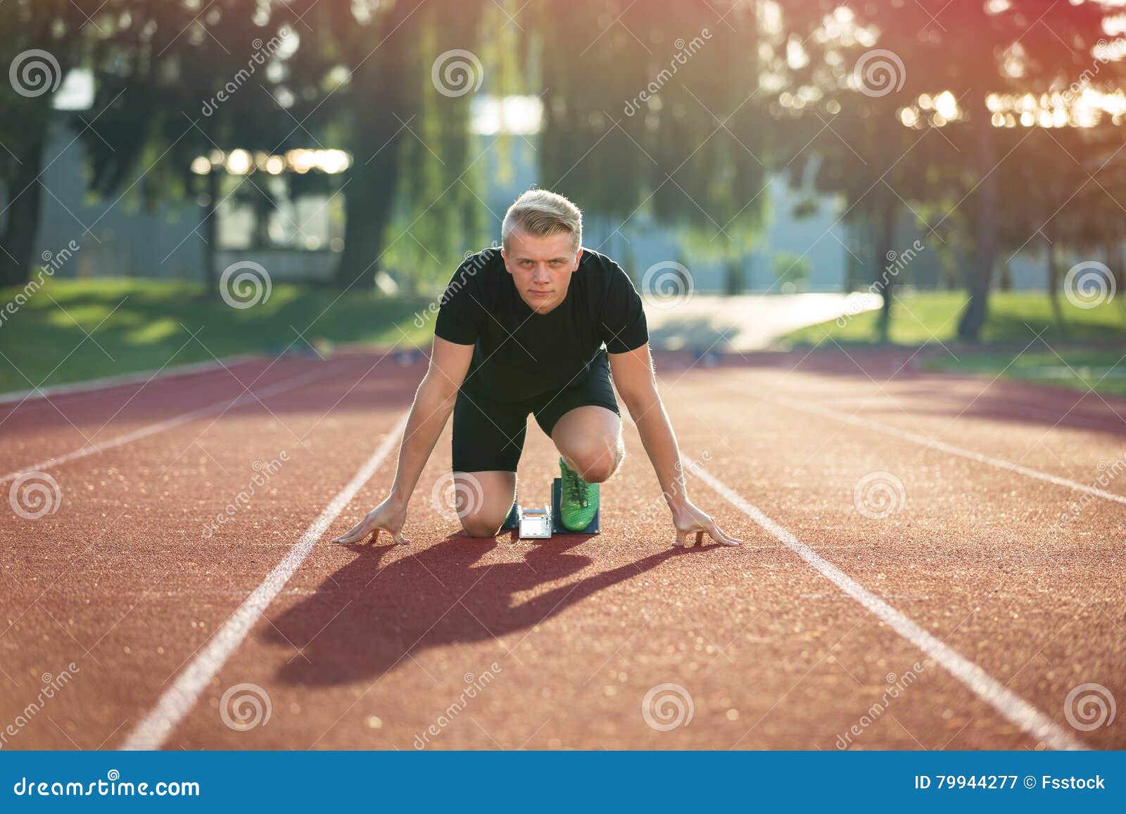 Detailed View of a Sprinter Getting Ready To Start. Selective Focus ...