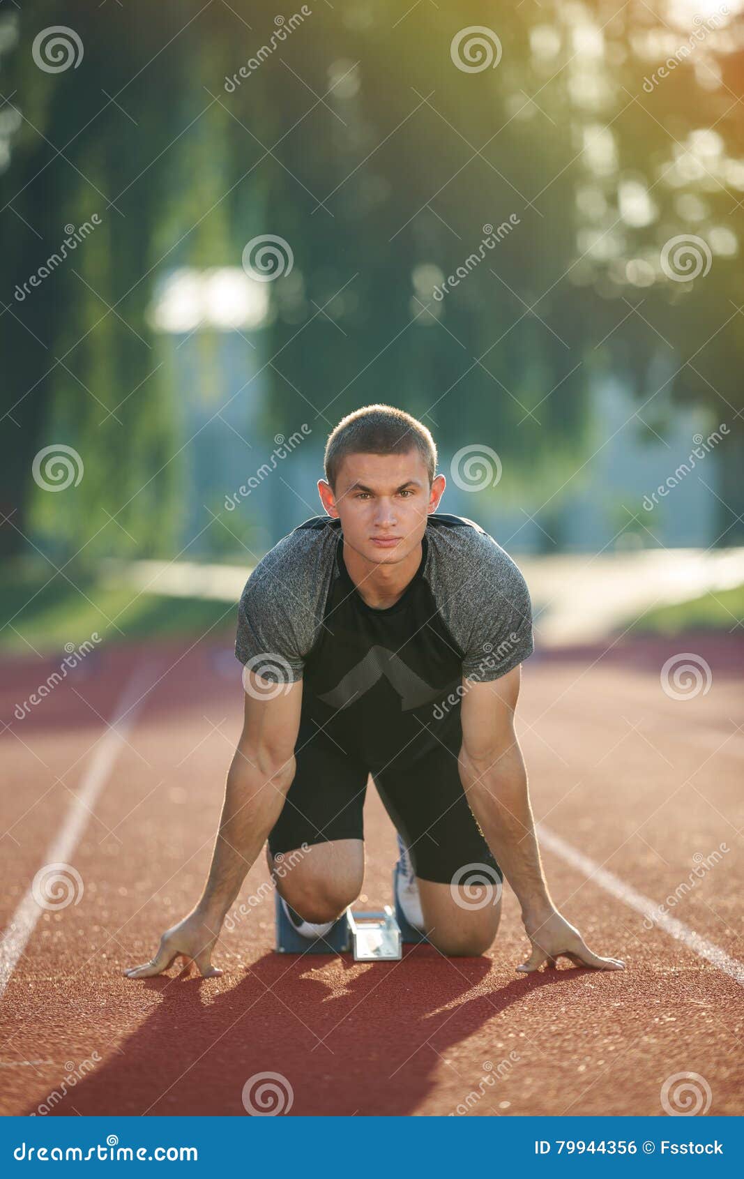 Detailed View of a Sprinter Getting Ready To Start. Selective Focus ...