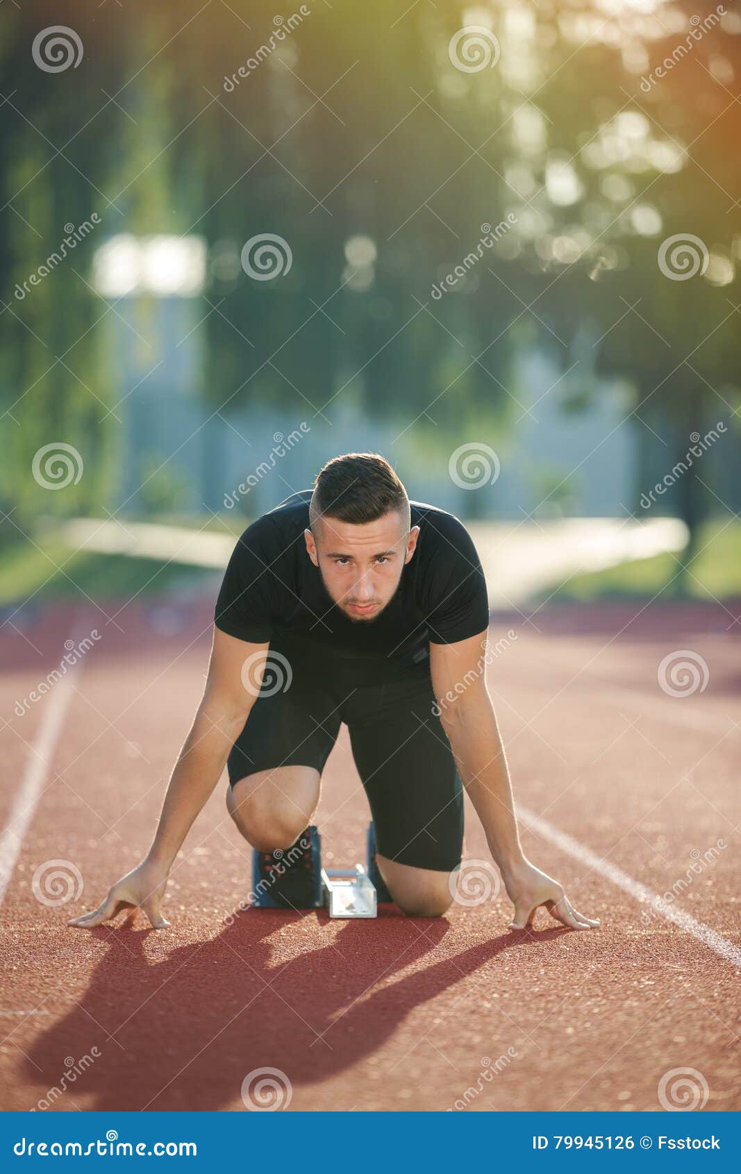 Detailed View of a Sprinter Getting Ready To Start. Selective Focus ...