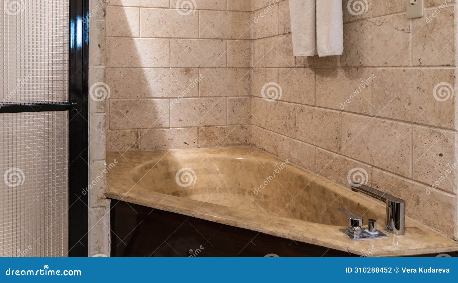 Details of the Bathroom Interior. a Beige Triangular Bathtub Stock ...