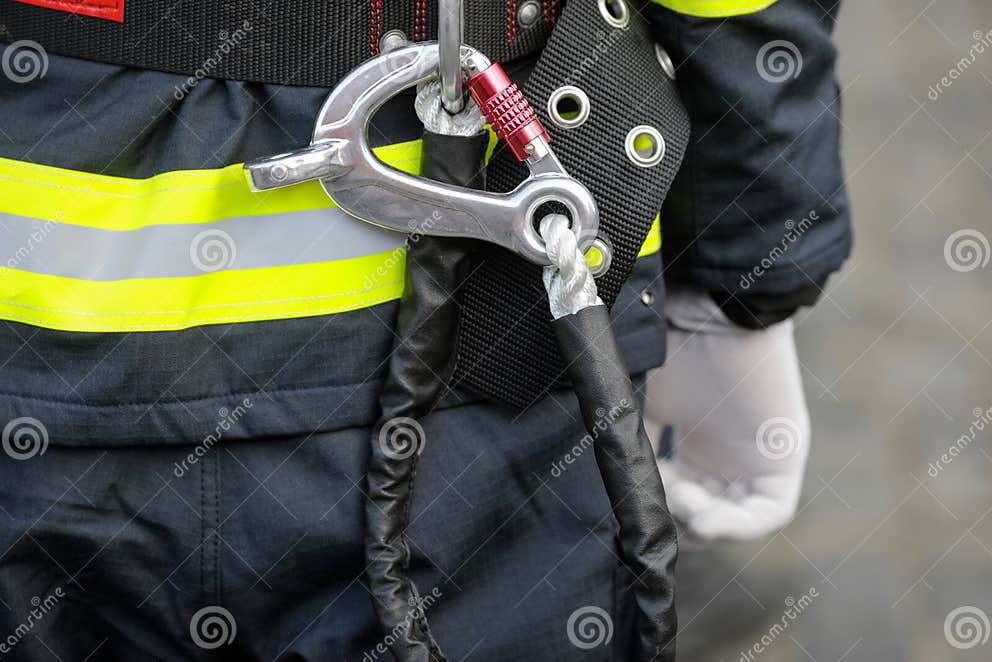 Details with the Carabiner and Harness of a Firefighter Stock Photo ...