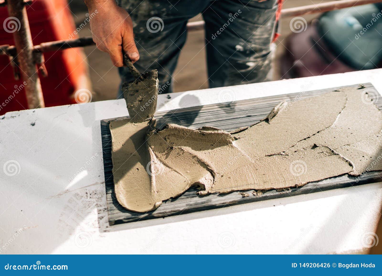 Details of Worker Using Mortar for Stone Installation.Industrial Worker ...