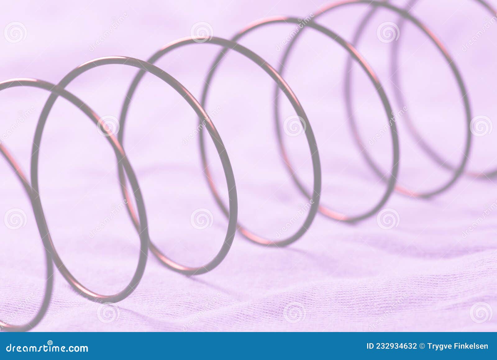 Details of a Metal Spring on Blue Cloth Stock Photo - Image of vintage ...