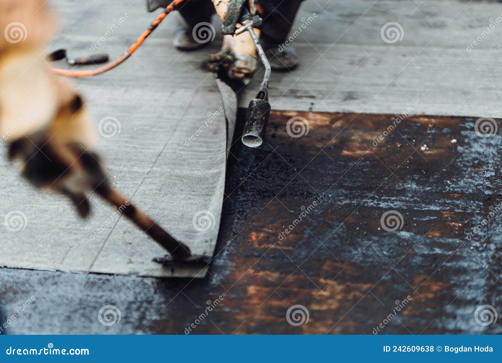 Details of Professional Construction Workers Using Blowtorch and Flame ...