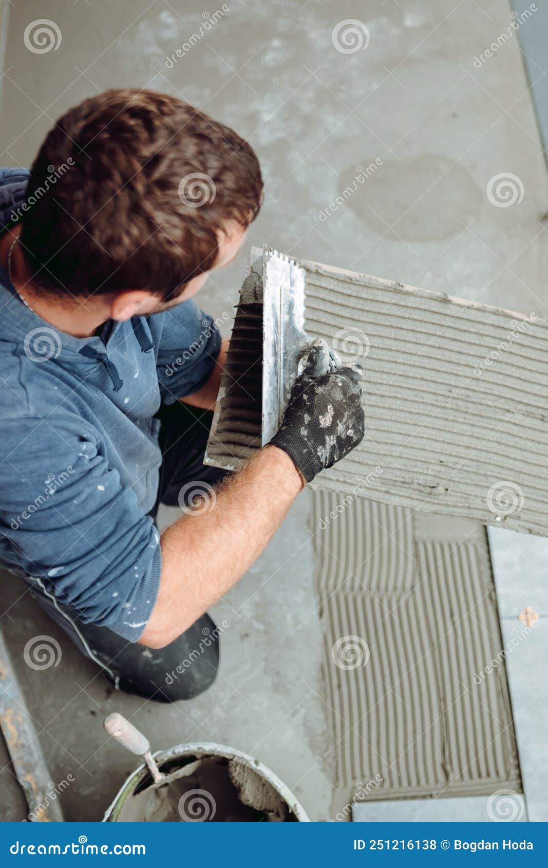 Details of Worker Installing Ceramic Tiles Stock Photo - Image of ...