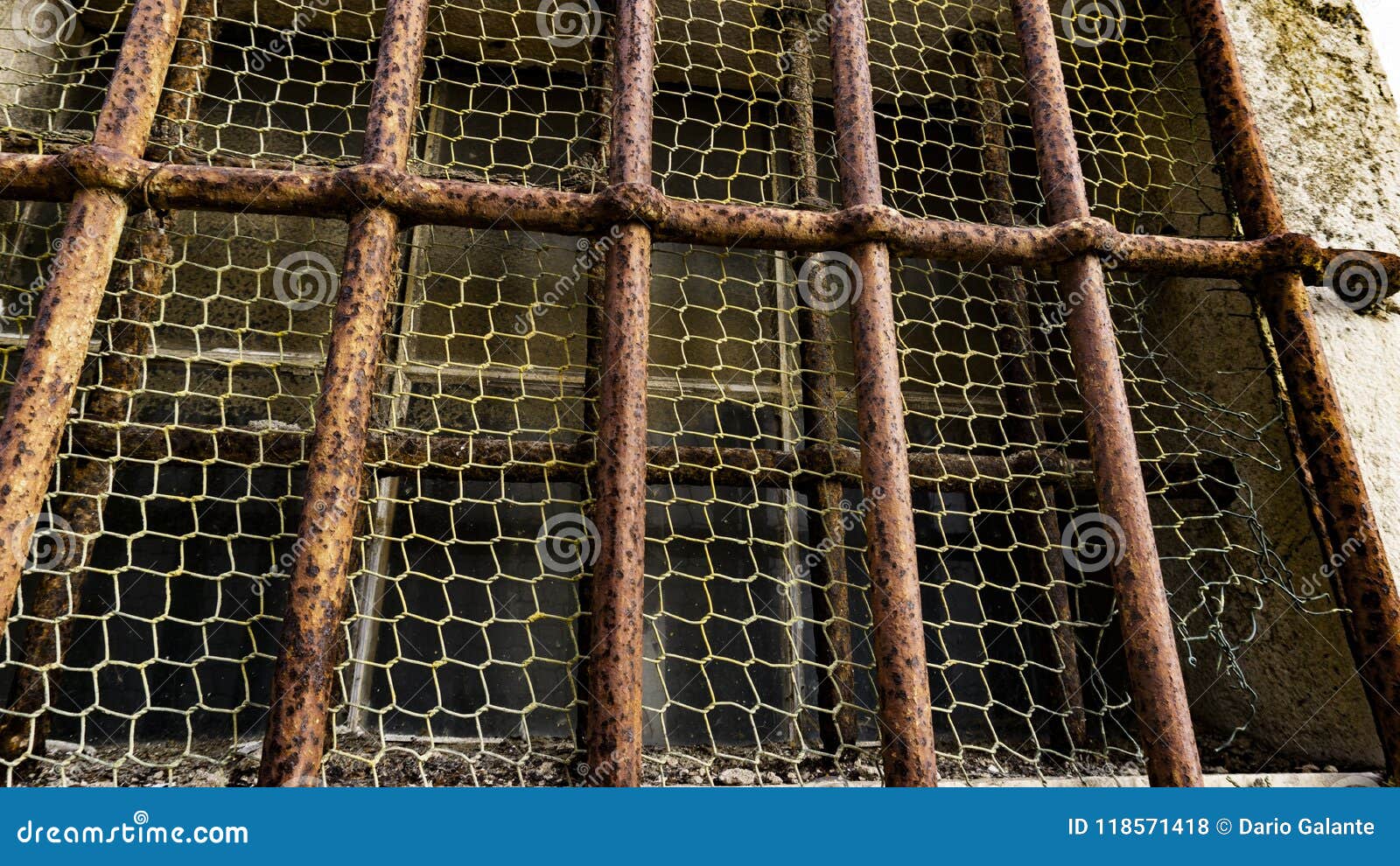 Rusty bars of a jail stock photo. Image of link, building - 118571418