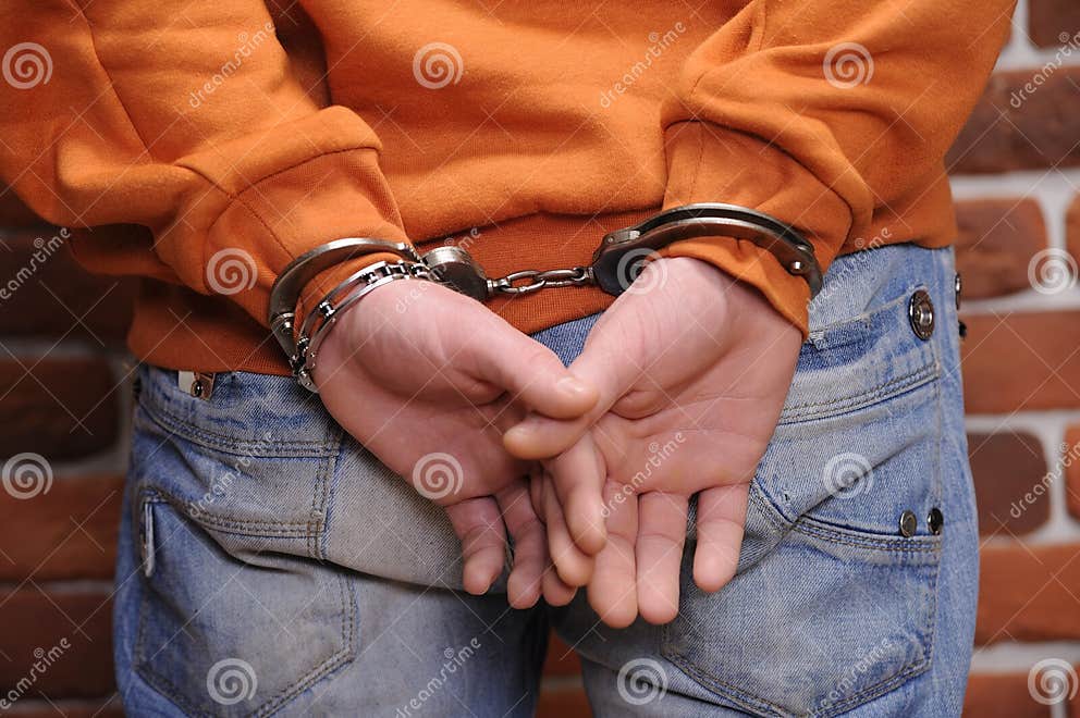 Detainee in handcuffs stock image. Image of safety, metal - 22698093