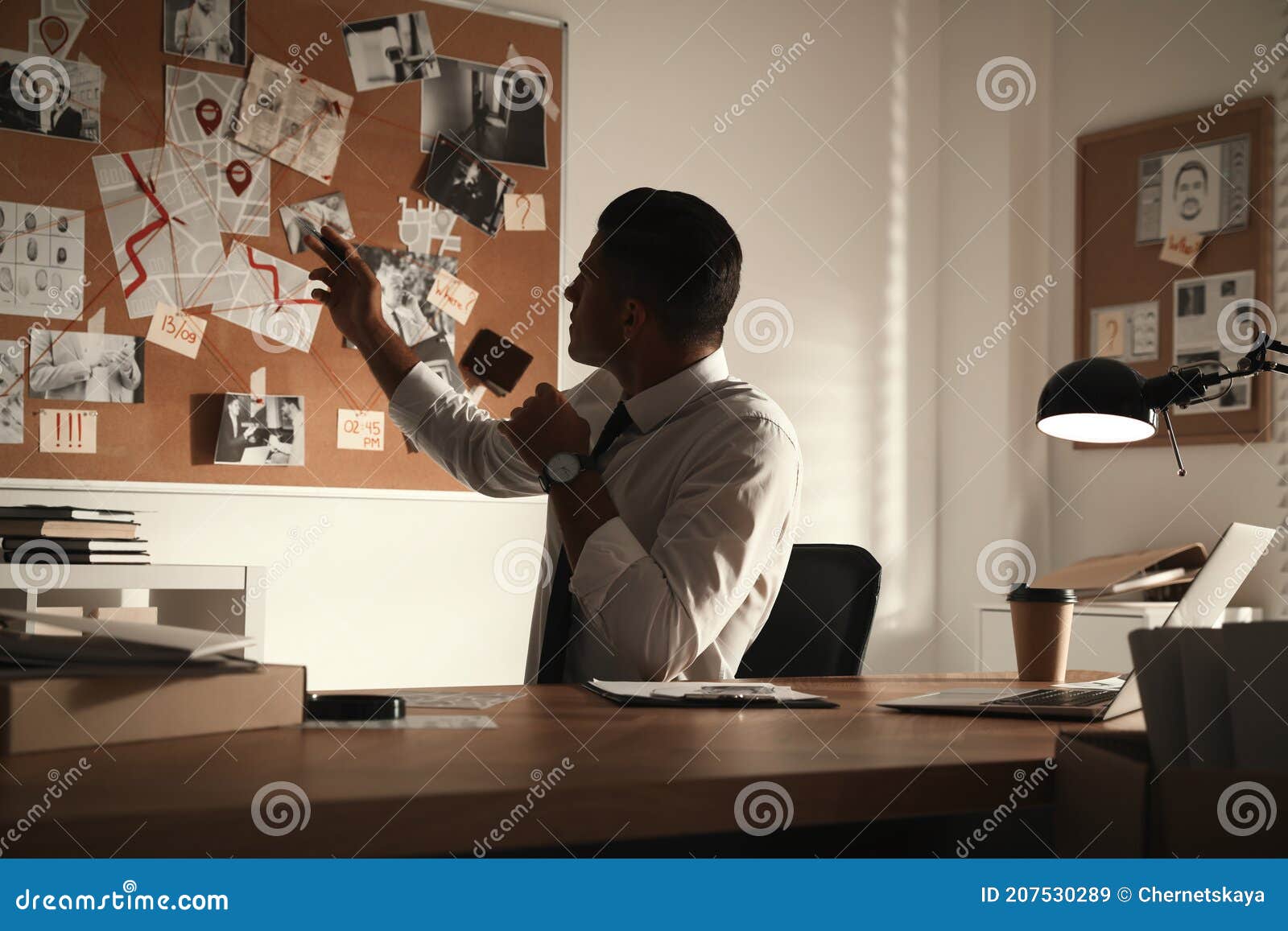 Detective Looking at Evidence Board in Office Stock Image - Image of ...