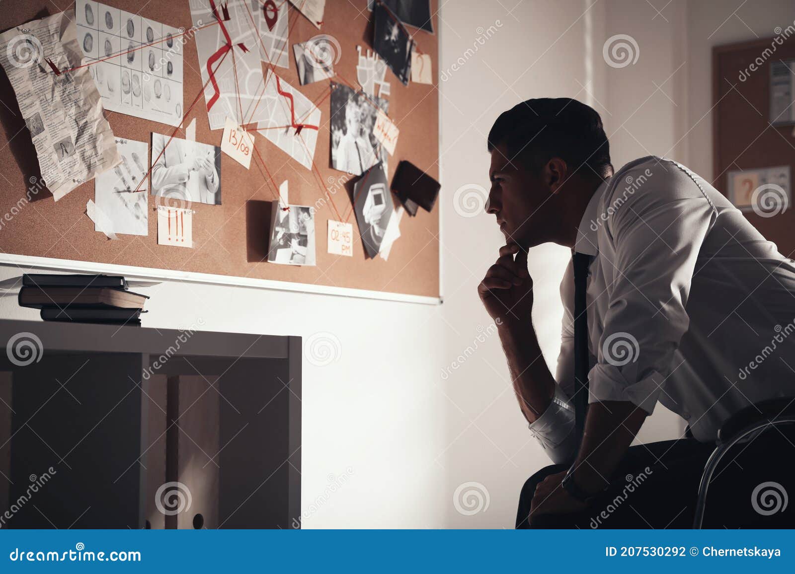 Detective Looking at Evidence Board in Office Stock Photo - Image of ...