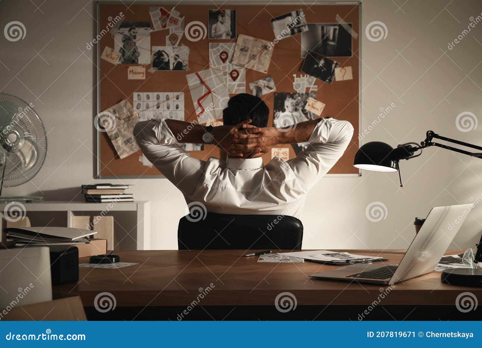 Detective Looking at Evidence Board in Office, Back View Stock Image ...
