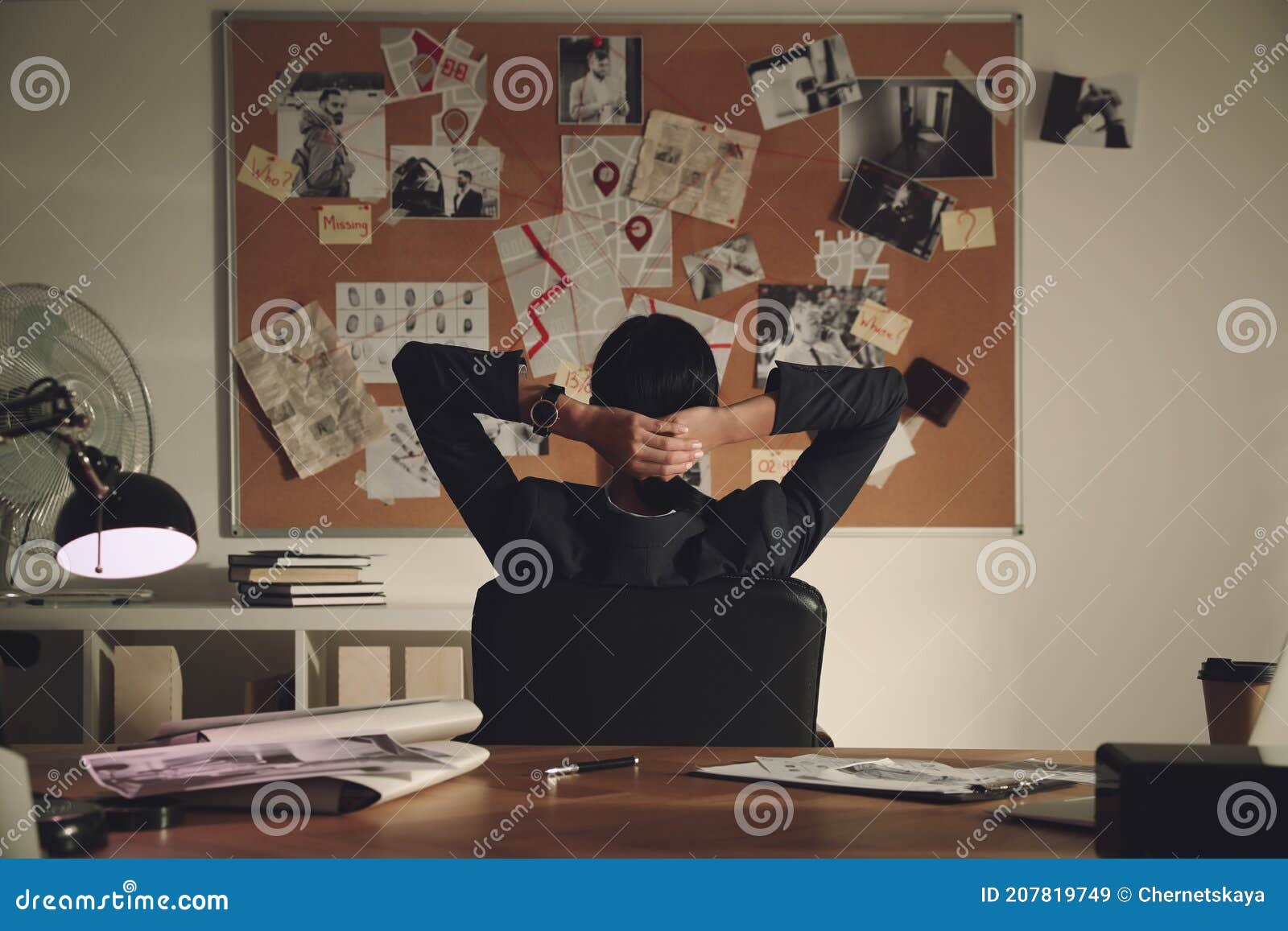 Detective Looking at Evidence Board in Office, Back View Stock Image ...