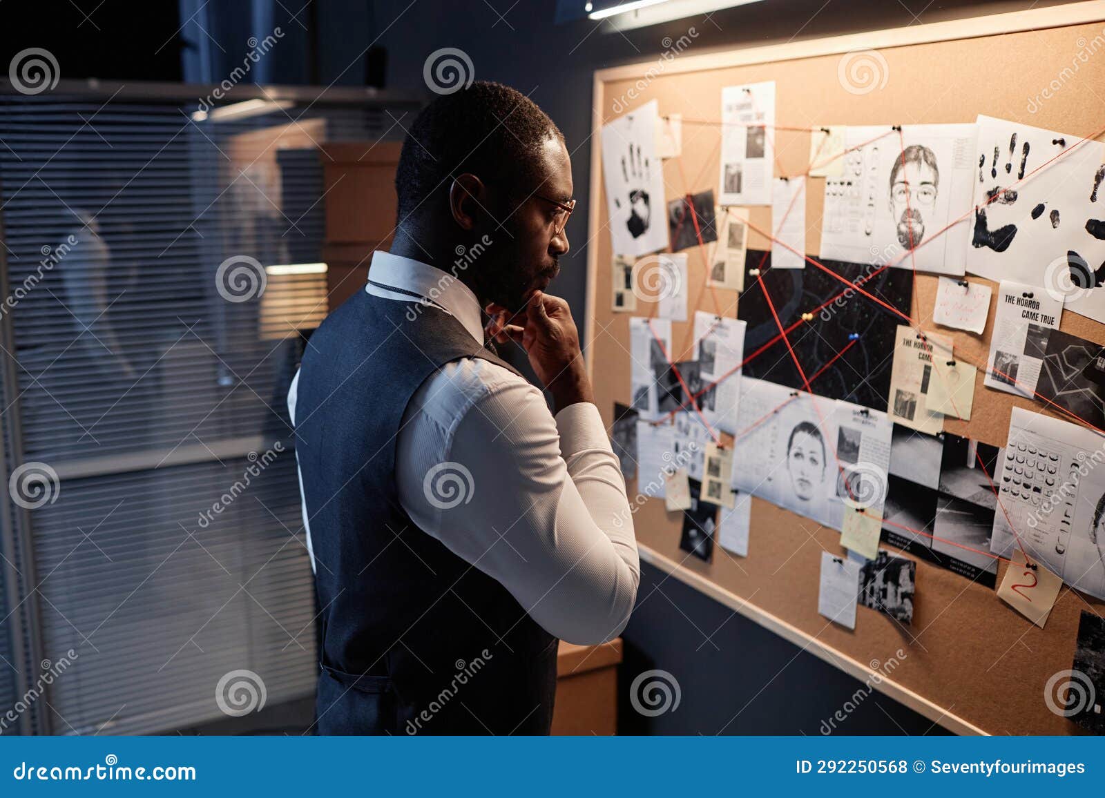 Detective Looking at Evidence Board in Office and Thinking ...