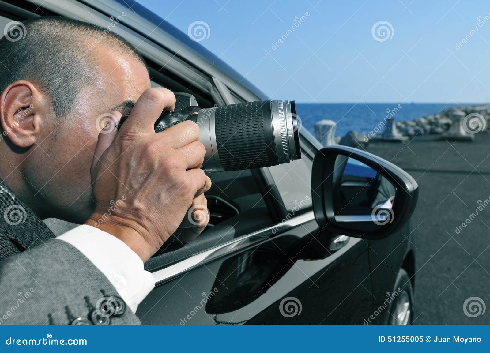 Detective or Paparazzi Taking Photos from Inside a Car Stock Image ...