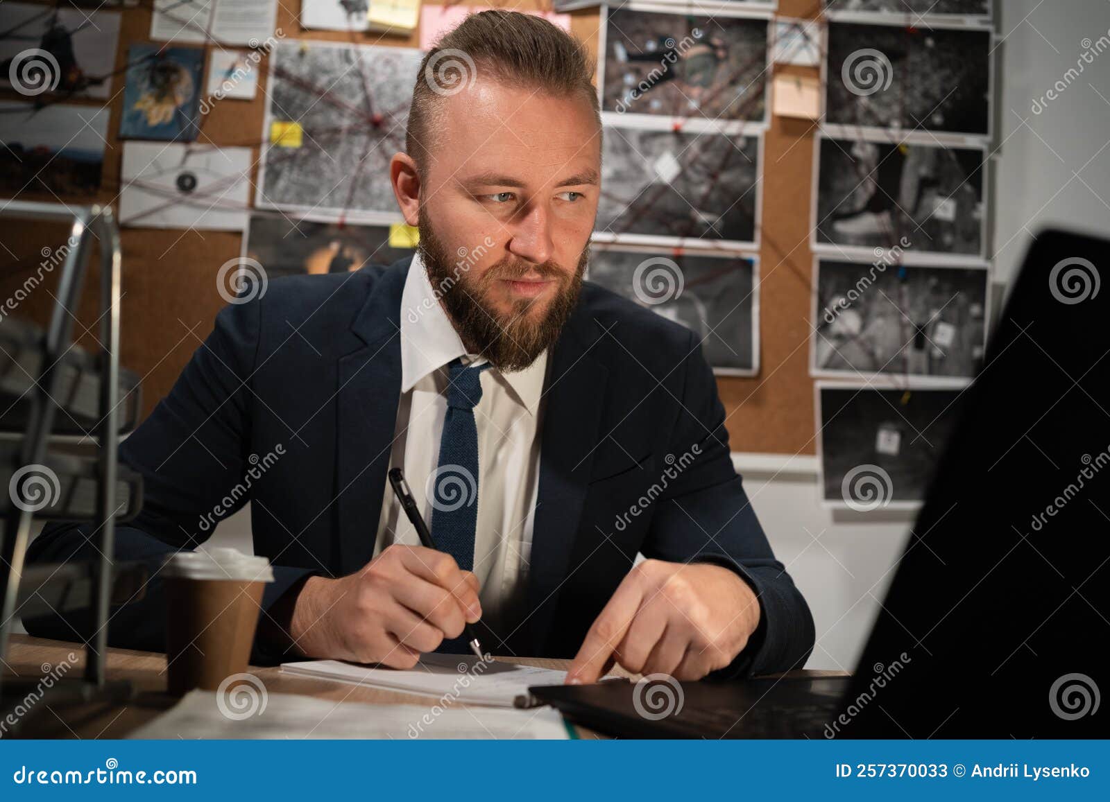 Detective Processing Evidence in Office, Working at Desk in His Office ...