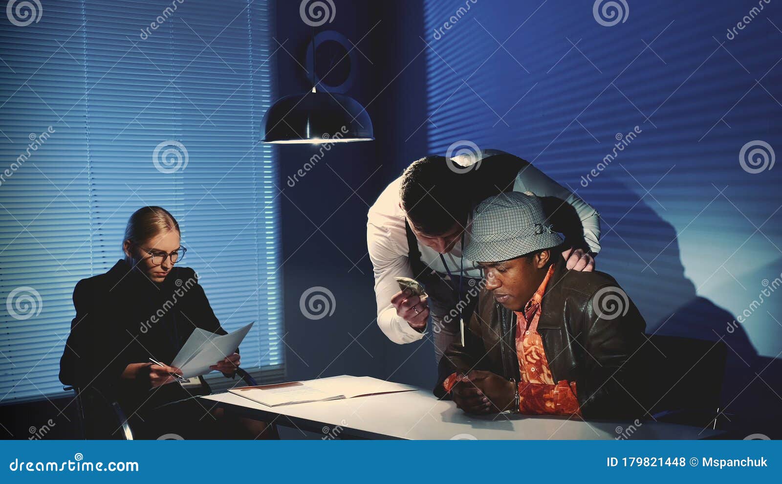 Detective Uses Force in Questioning the Accused Black Man. Stock Photo ...