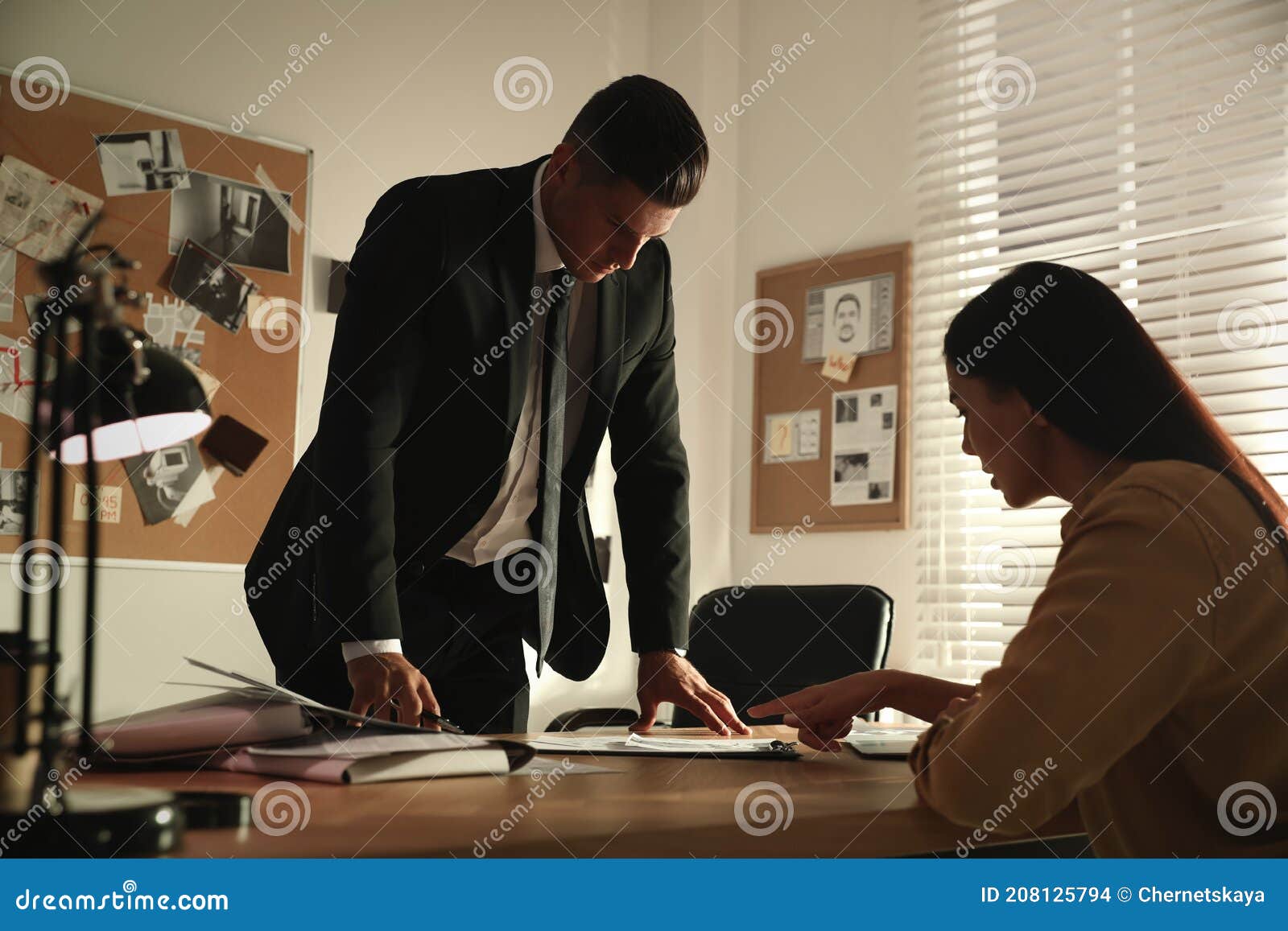 Detective Working with Client in His Office Stock Photo - Image of ...