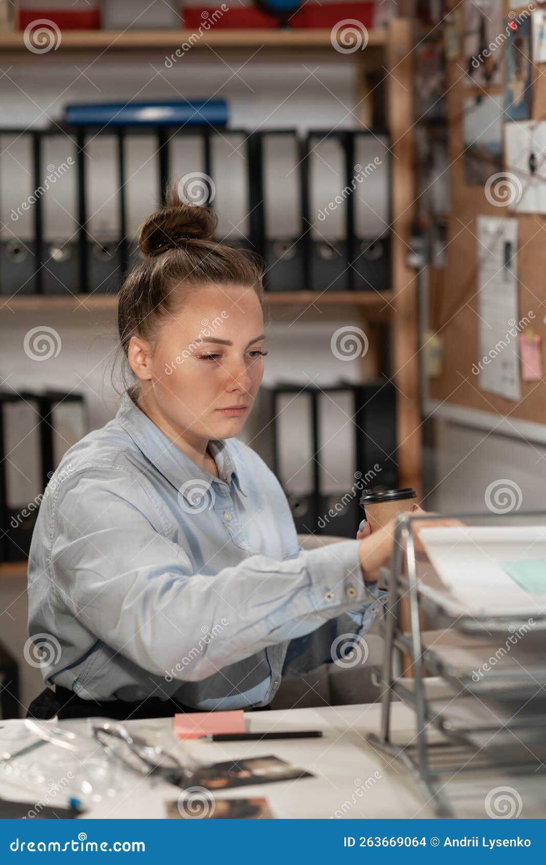 Detective Working at Desk in Her Office, Processing Evidence Stock ...
