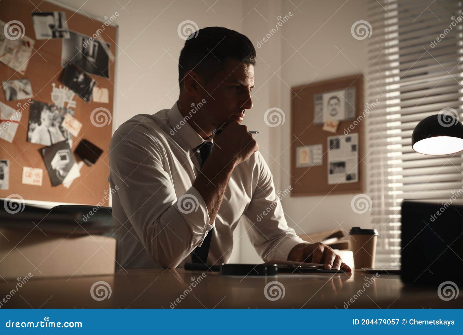 Detective Working at Desk in His Office Stock Image - Image of ...