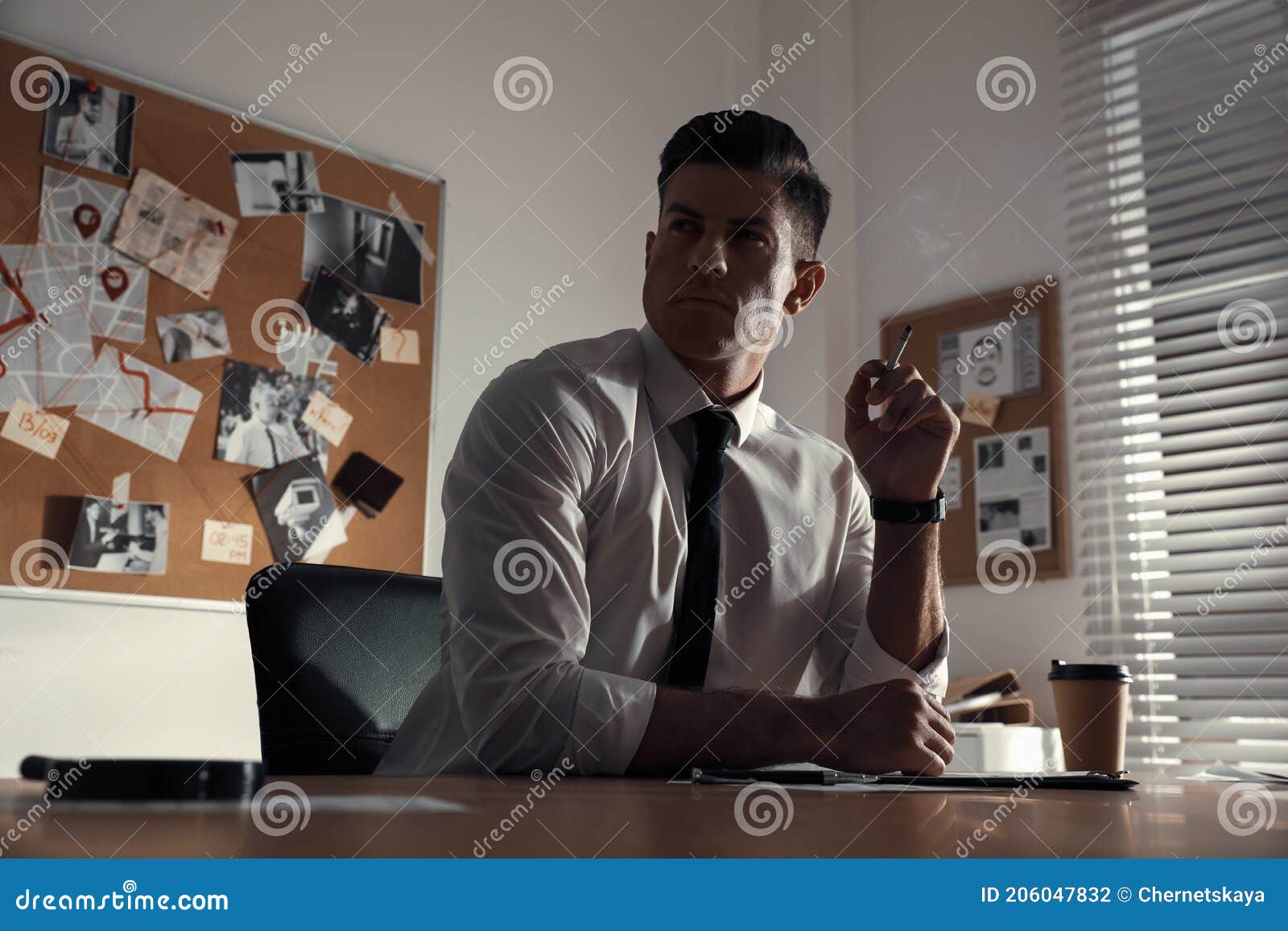 Detective Working at Desk in His Office Stock Photo - Image of case ...