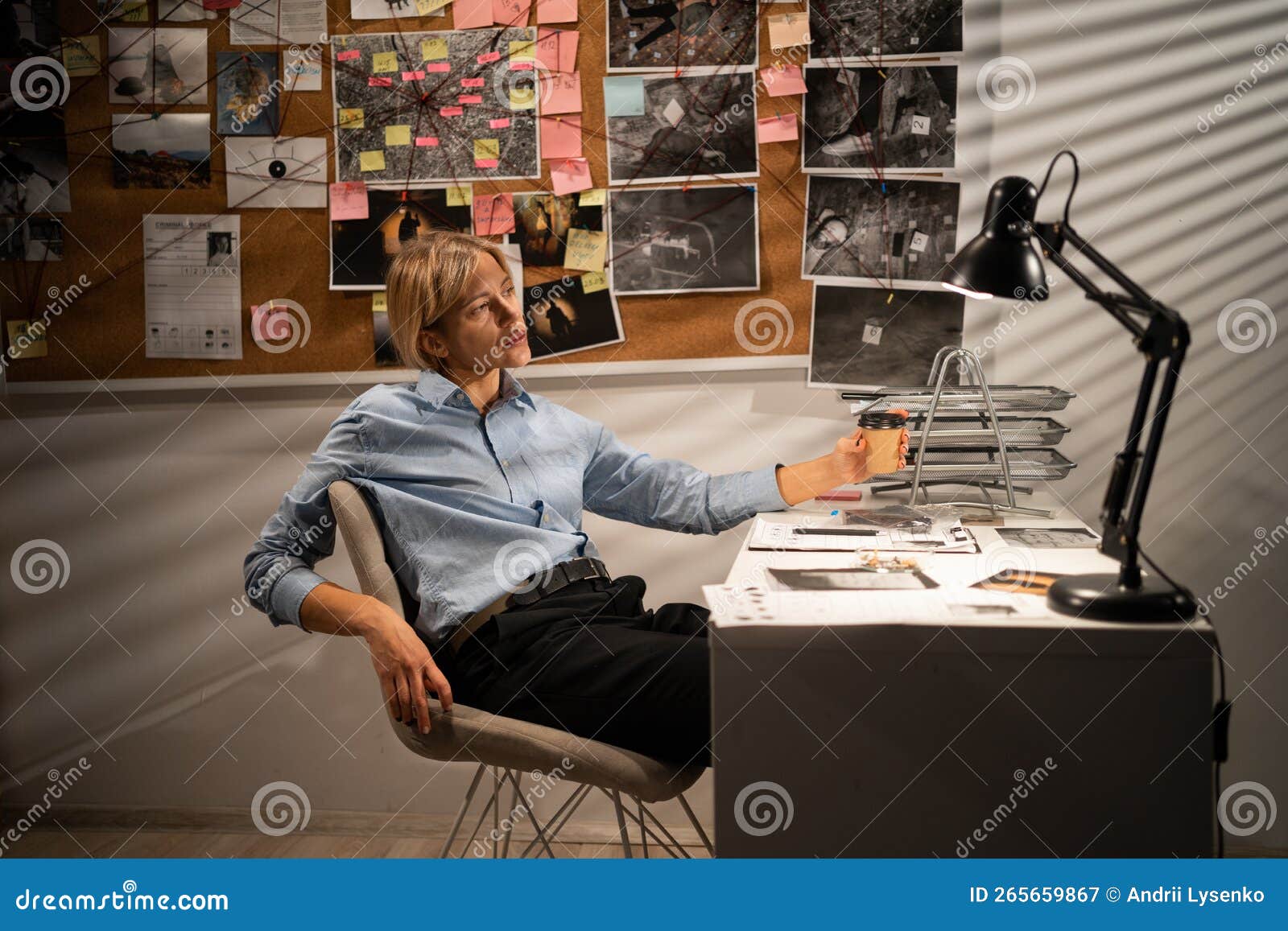 Detective Working in Her Office, Drinking Coffee and Thinking Stock ...
