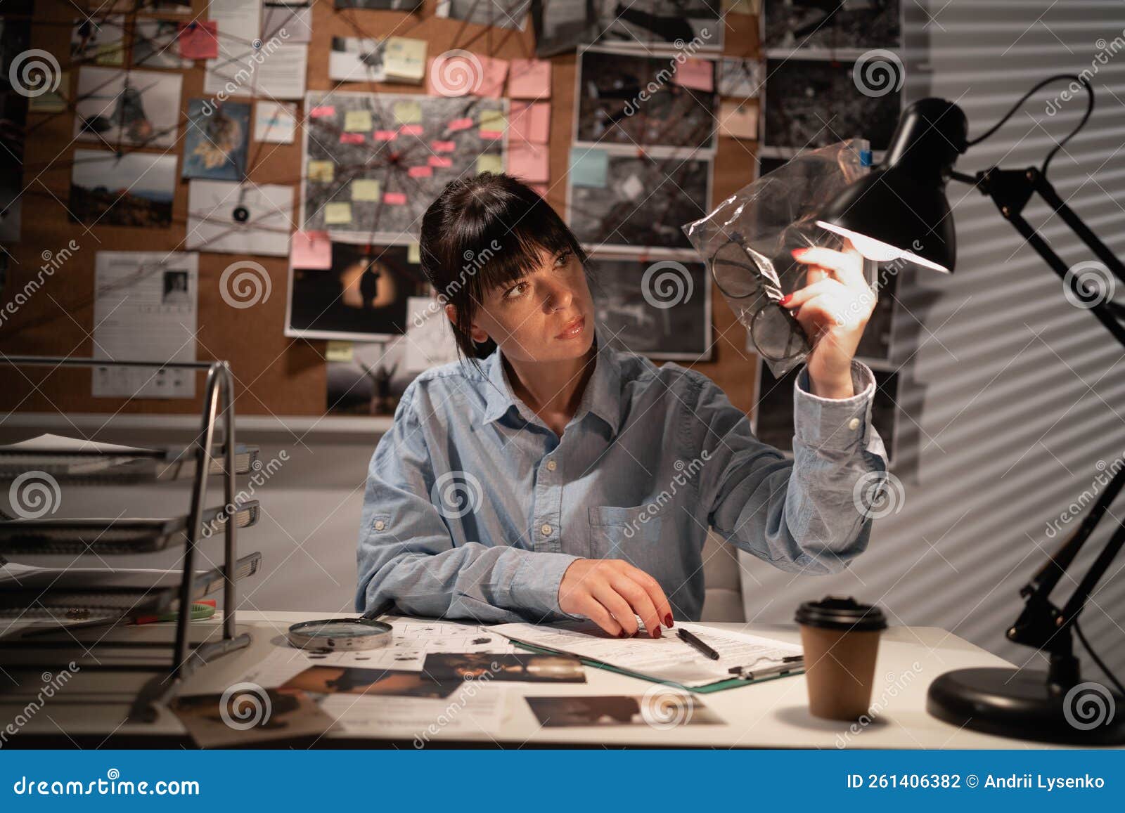 Detective Working in Her Office with Evidence Stock Photo - Image of ...