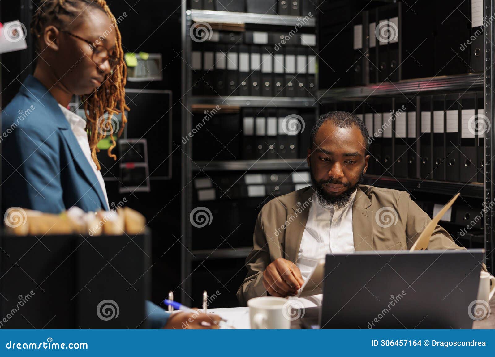 Detectives Analyzing Police Report File and Taking Notes Stock Photo ...