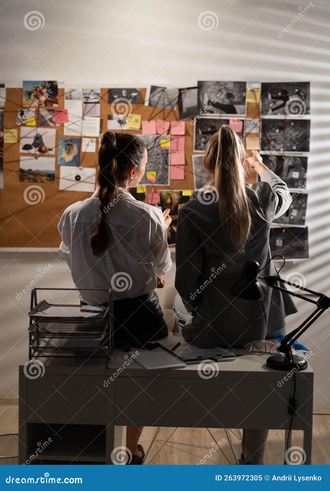 Detectives Looking at Evidence Board in Office, Back View. Stock Image ...