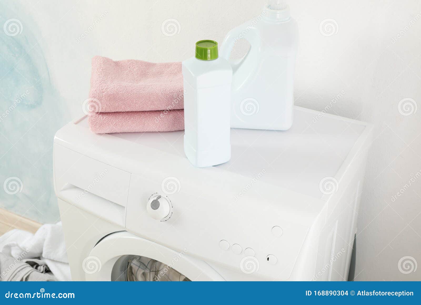 Detergents and Towels on Washing Machine Stock Photo - Image of ...