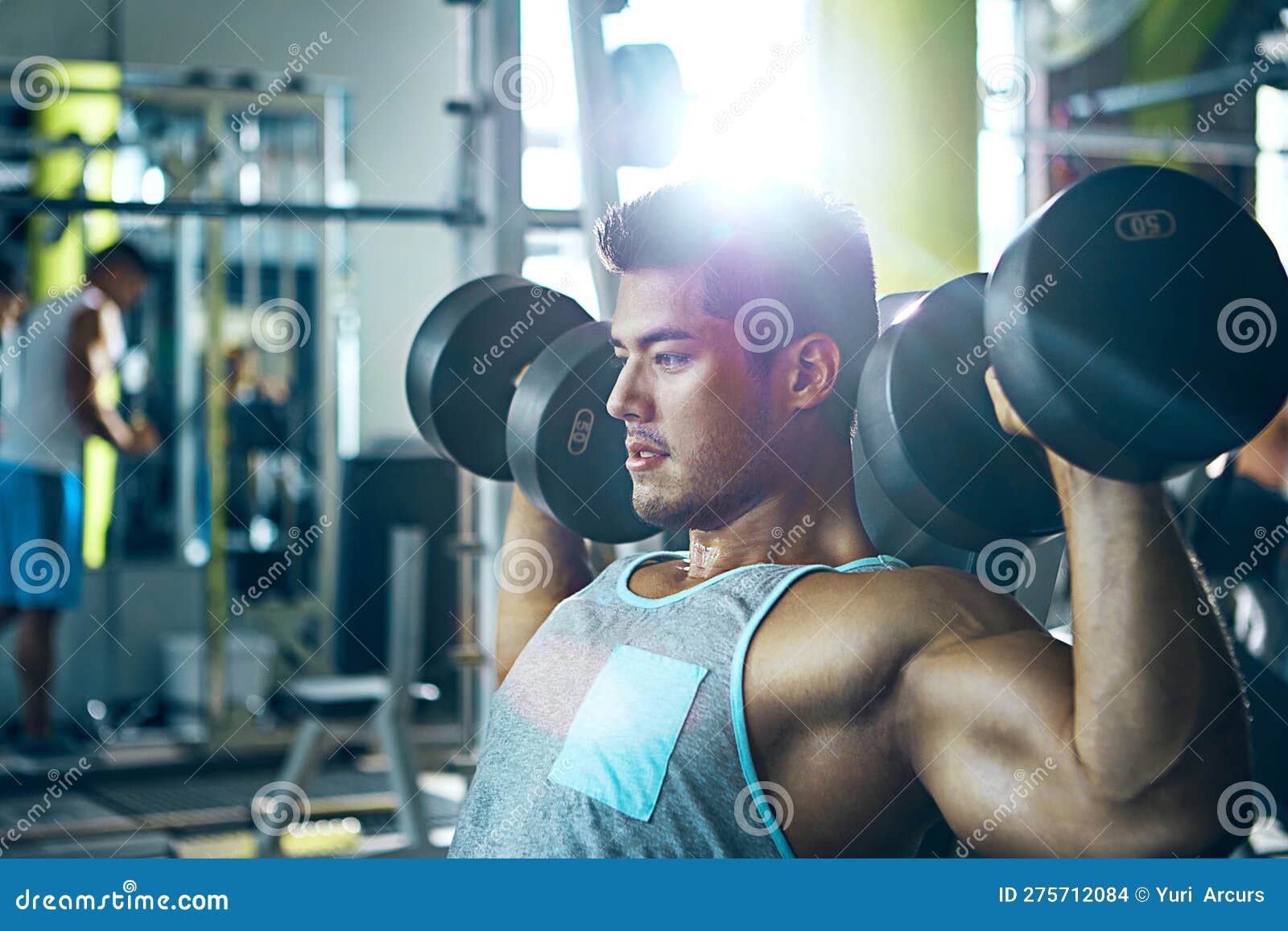Determination is Key. a Man Doing a Upper-body Workout at the Gym ...