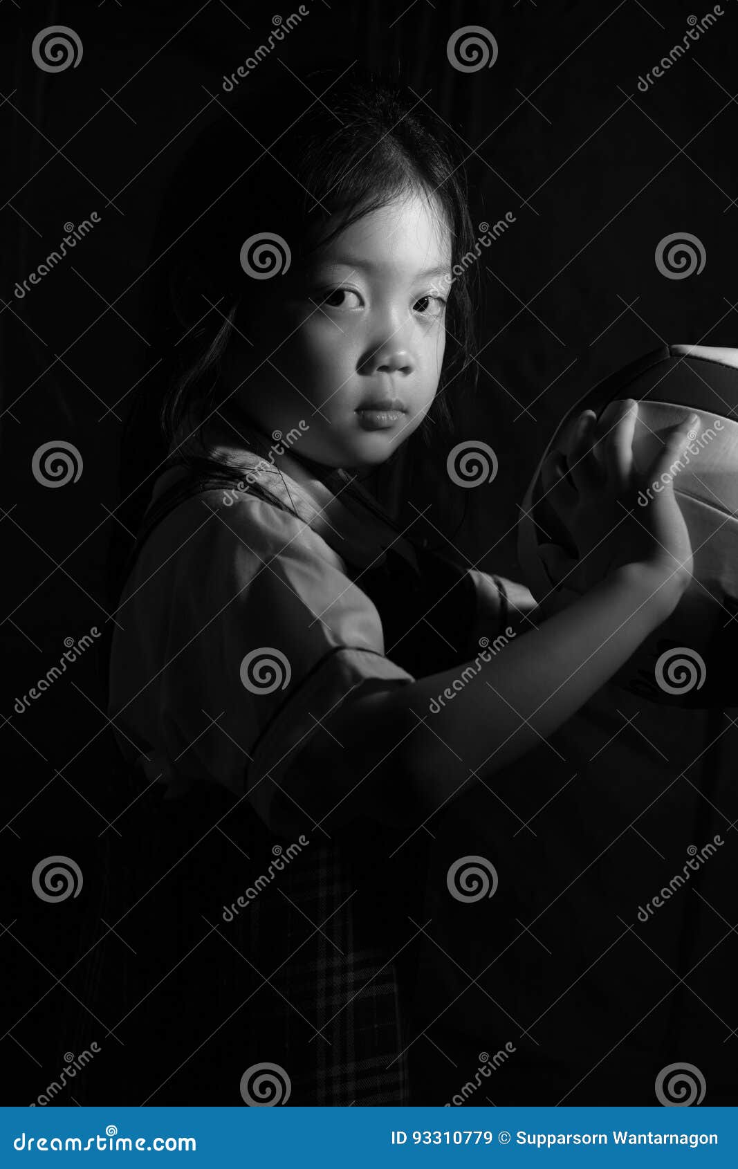 Determined Asian Child Ready for Competition in Black and White Stock ...