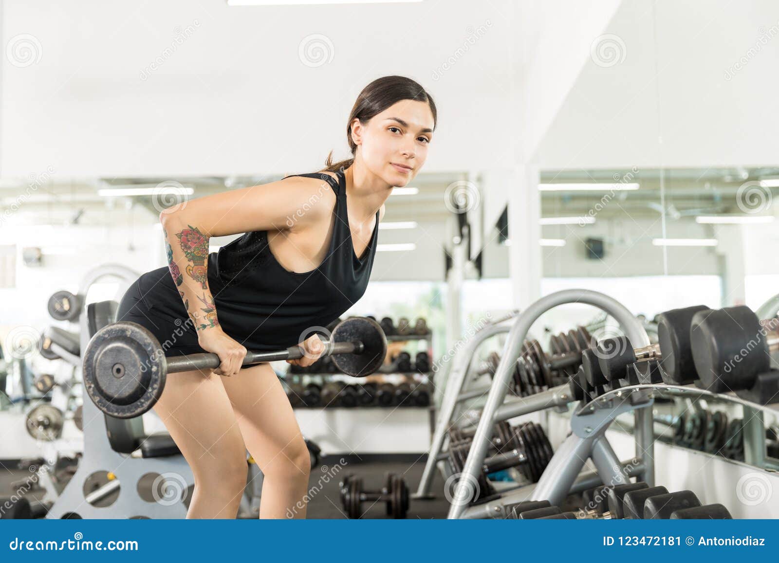 Athlete Doing Bent Over Row Exercise with Barbell in Gym Stock Image ...