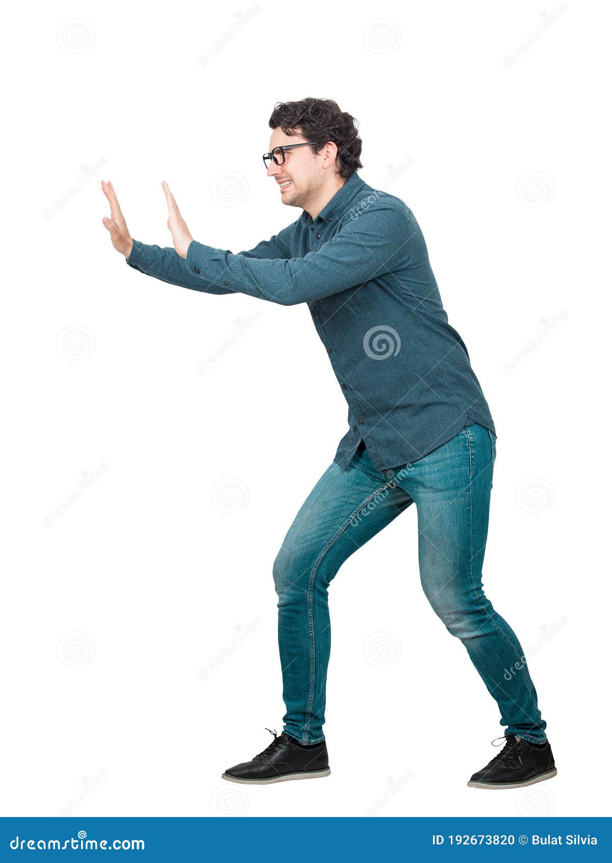 Determined Businessman Makes Effort Pushing an Heavy Invisible Object ...