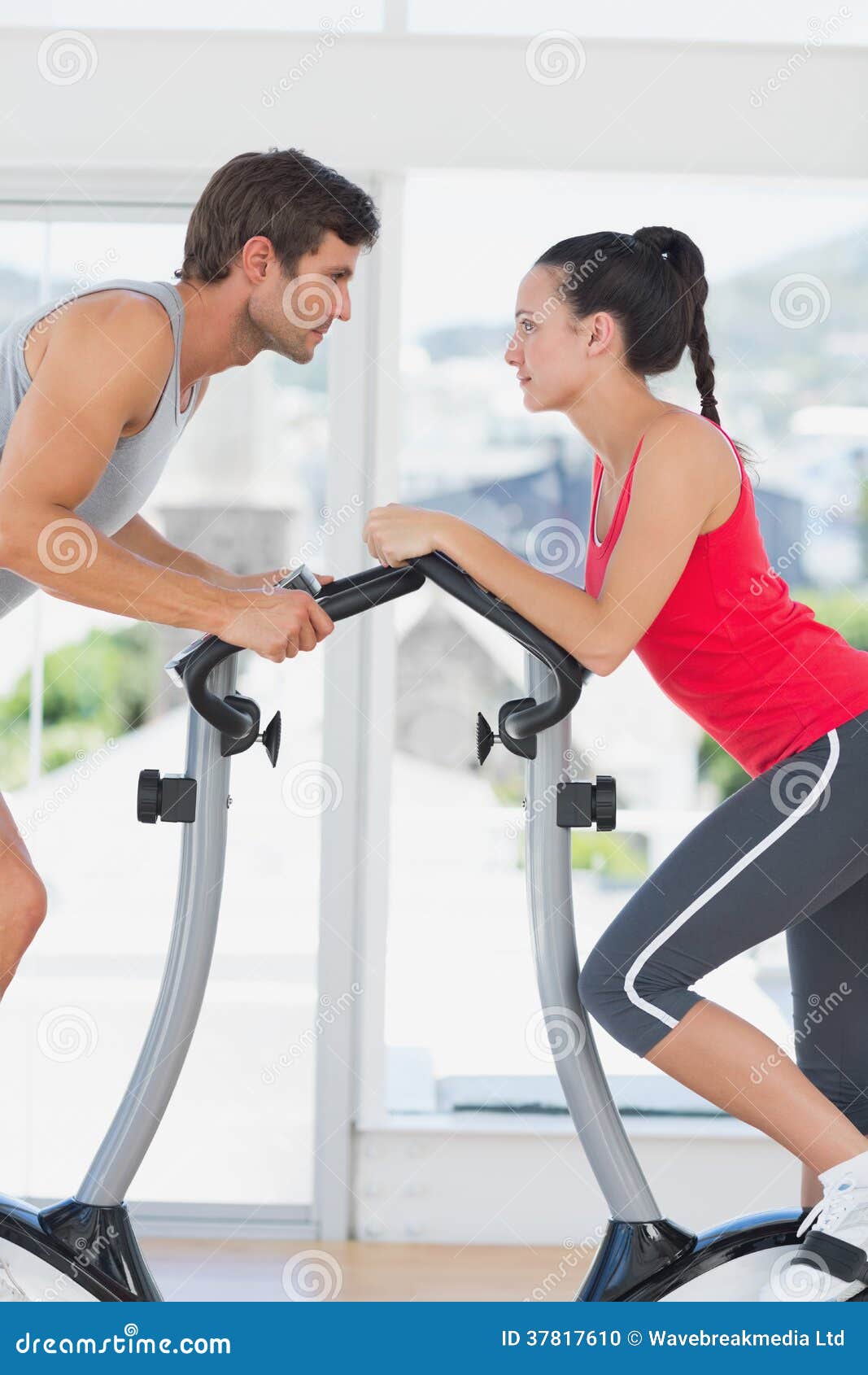 Determined Couple Working Out at Spinning Class Stock Photo - Image of ...