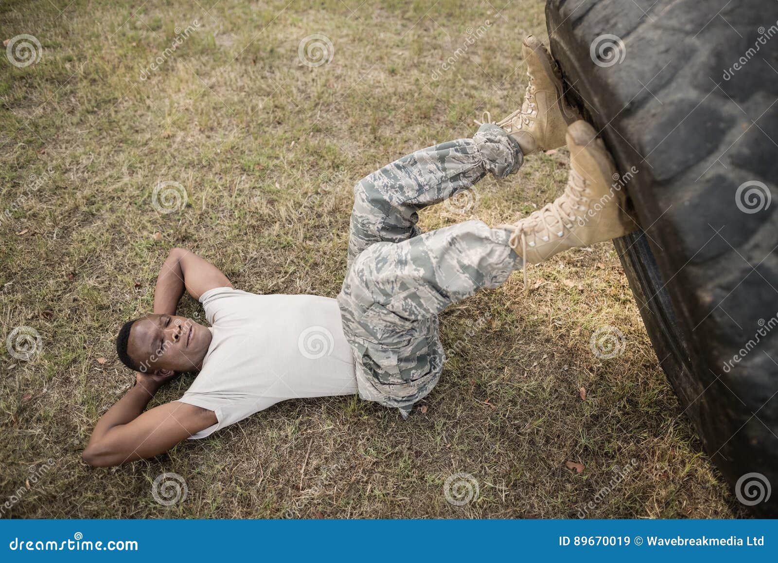 Determined Military Soldiers Exercising with Tyre Stock Image - Image ...