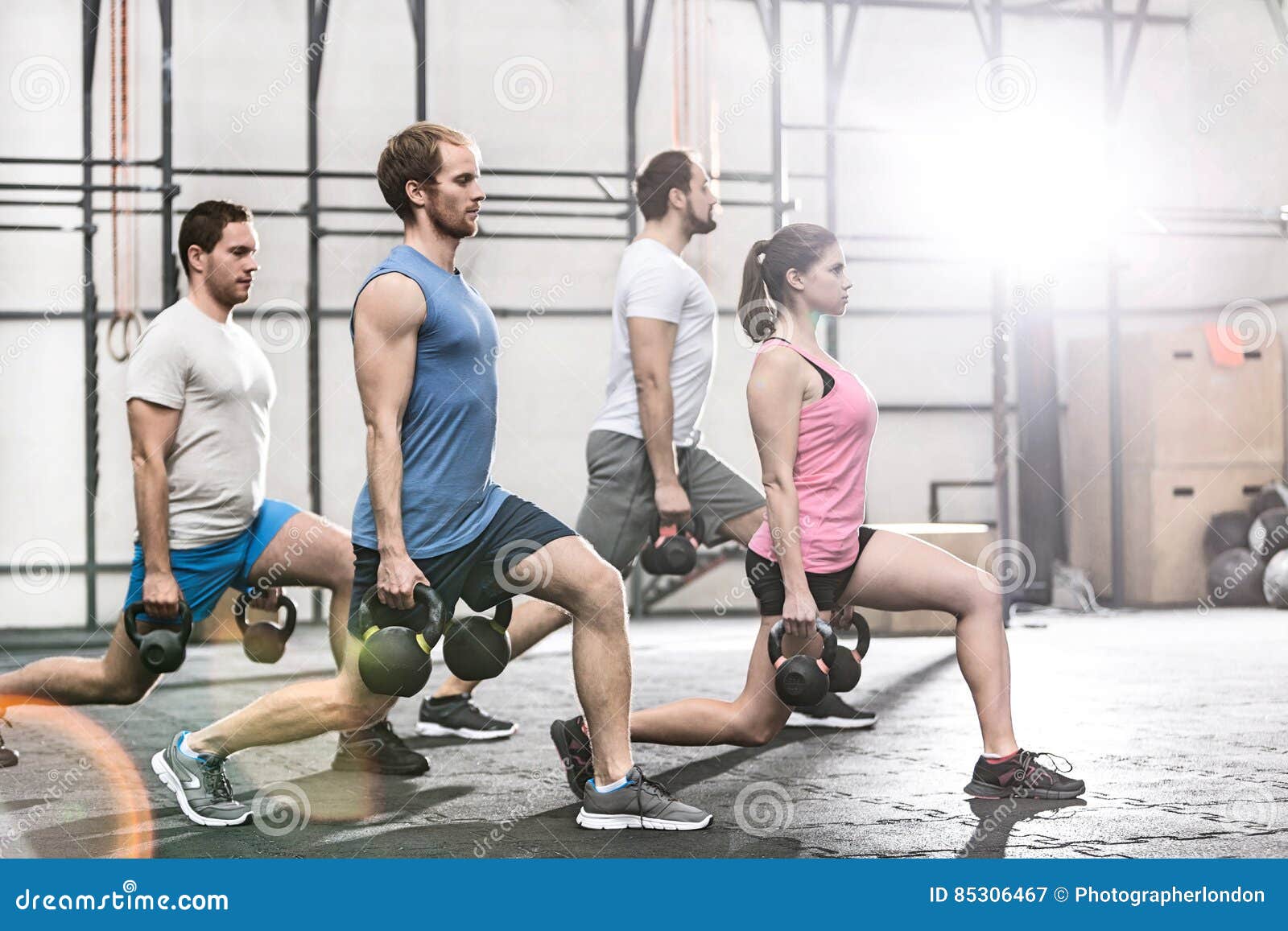 Determined People Lifting Kettlebells at Crossfit Gym Stock Image ...