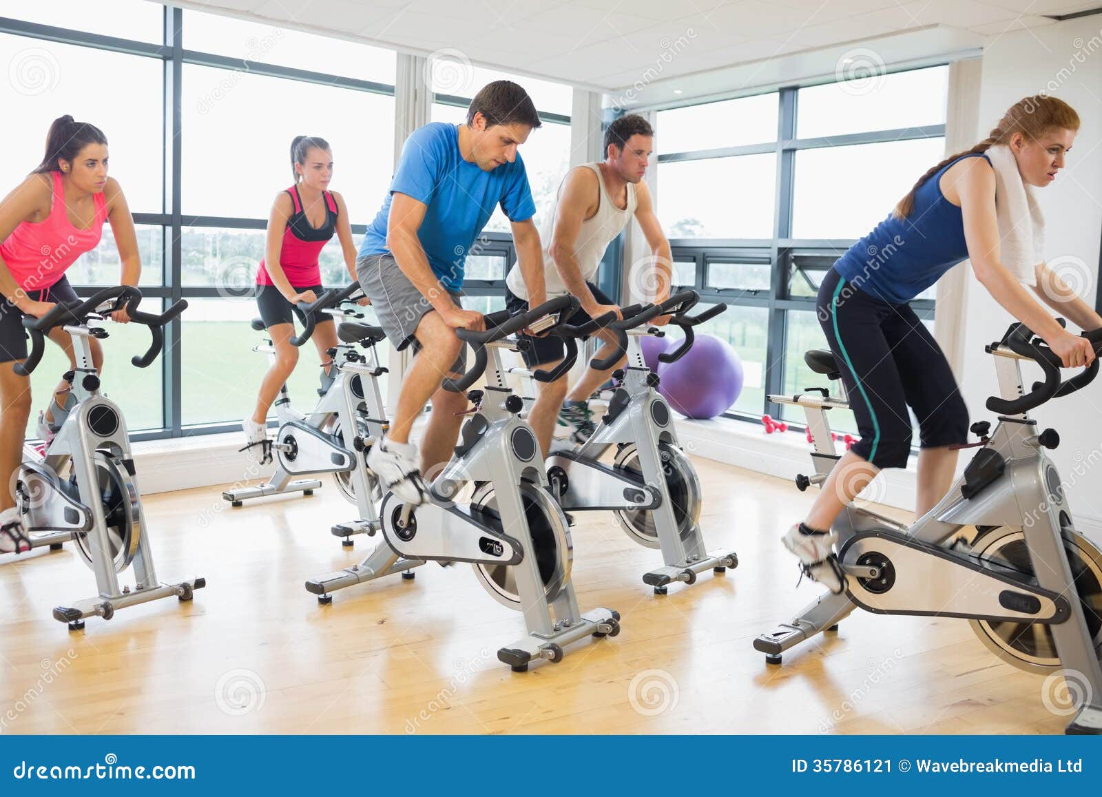 Determined People Working Out at Spinning Class Stock Image - Image of ...