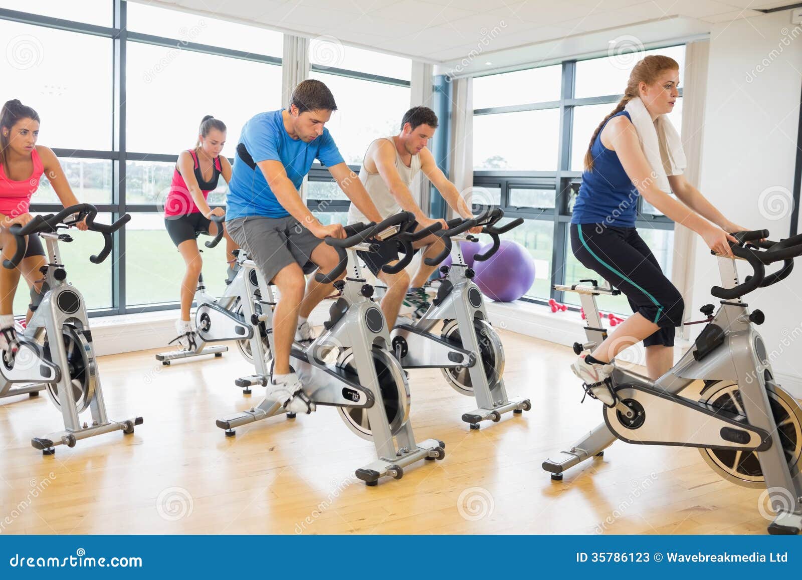 Determined People Working Out at Spinning Class Stock Image - Image of ...