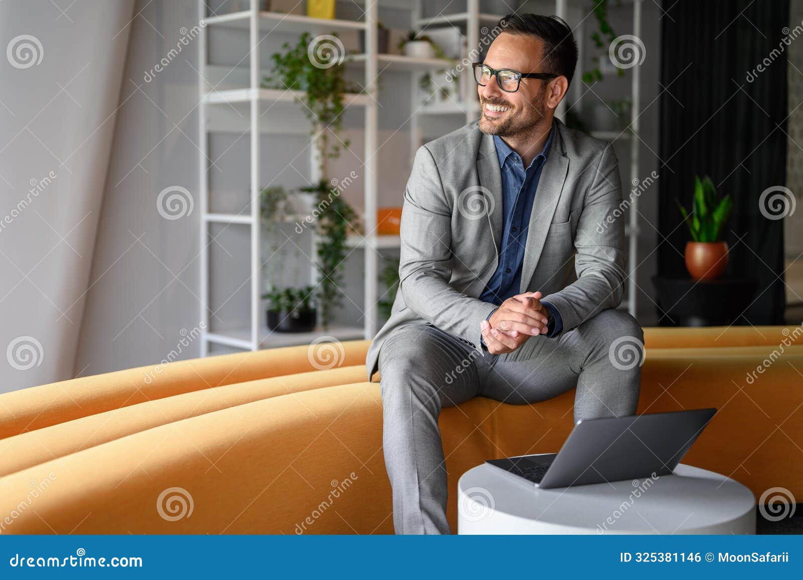 Determined Project Manager in Glasses Looking Away and Thinking Ideas ...