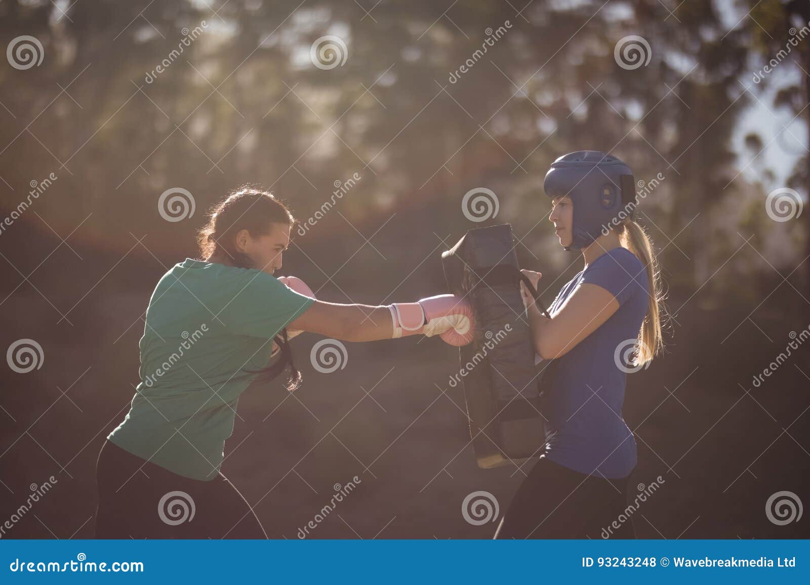 Determined Women Practicing Boxing during Obstacle Course Stock Photo ...