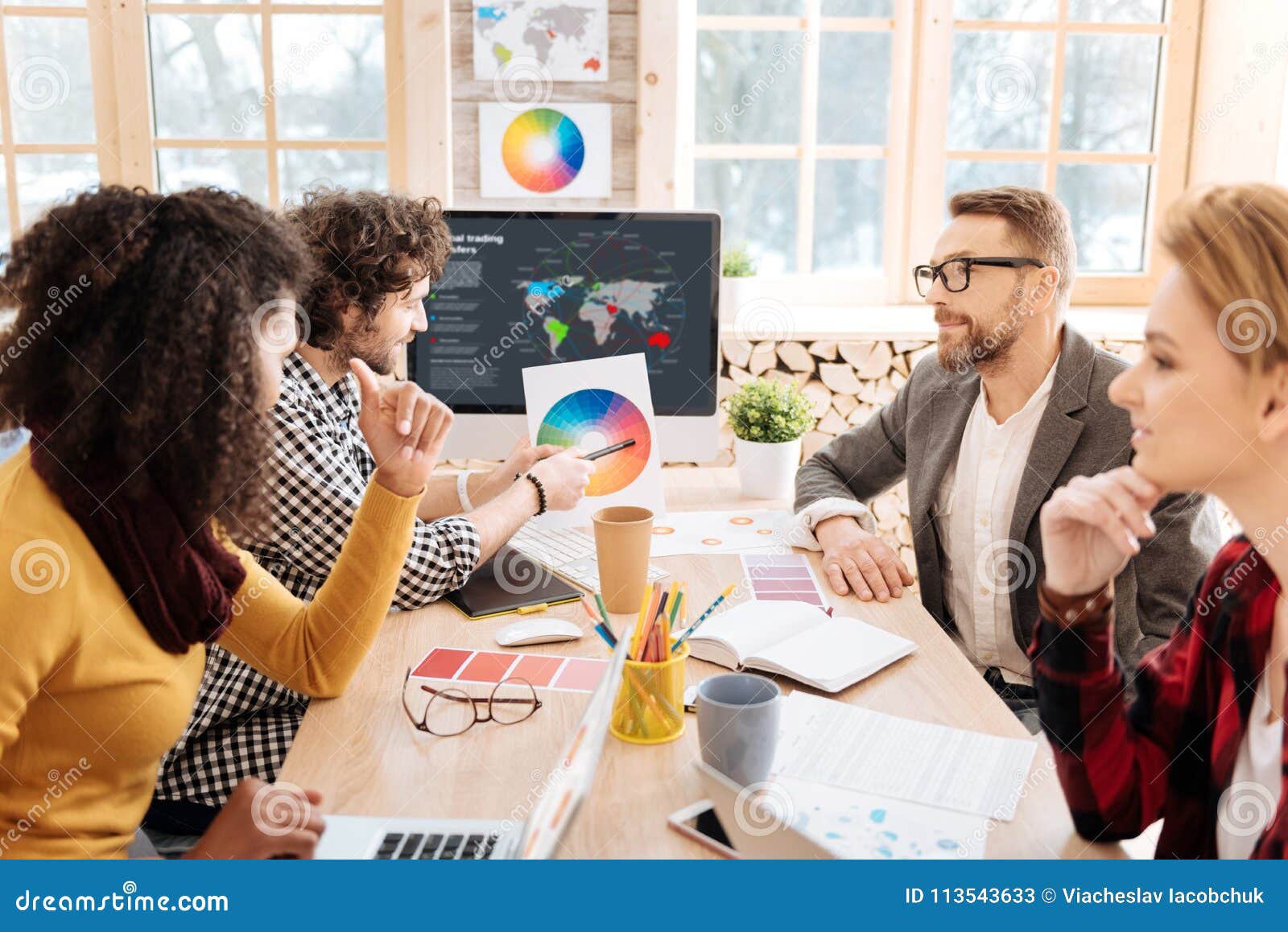 Determined Workers Discussing Work in the Office Stock Image - Image of ...