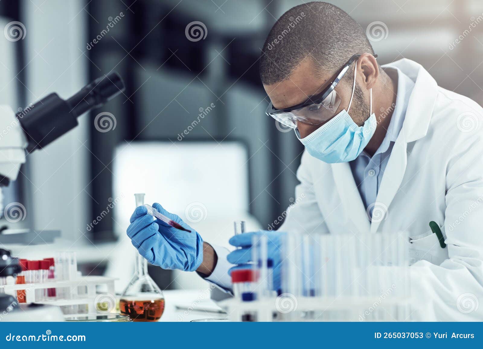 Determining a Cure for the Disease. a Young Male Scientist Working in ...