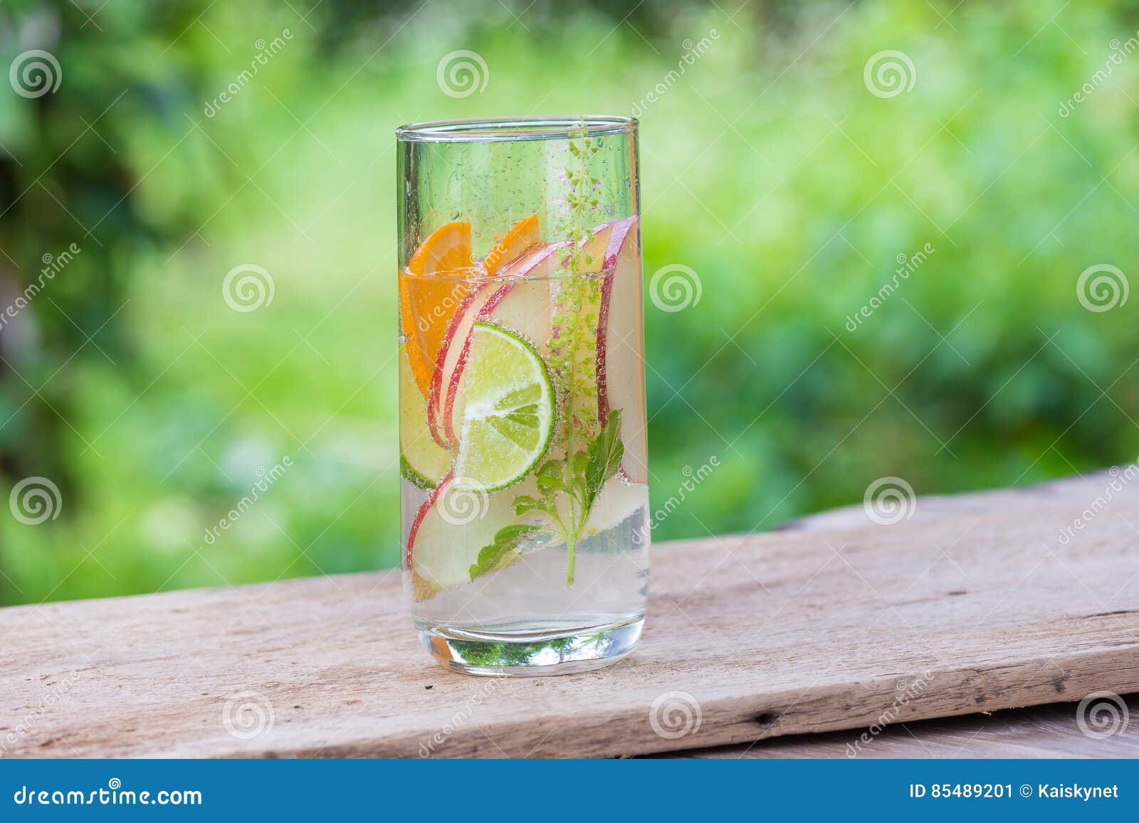 Detox Water with Apples, Orange and Lemon Stock Image - Image of chair ...
